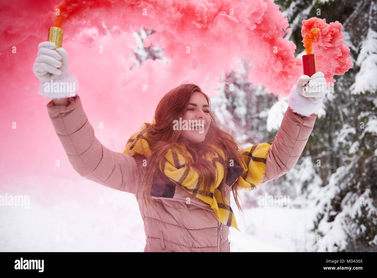 Woman standing in snow wearing hi-res stock photography and images - Alamy