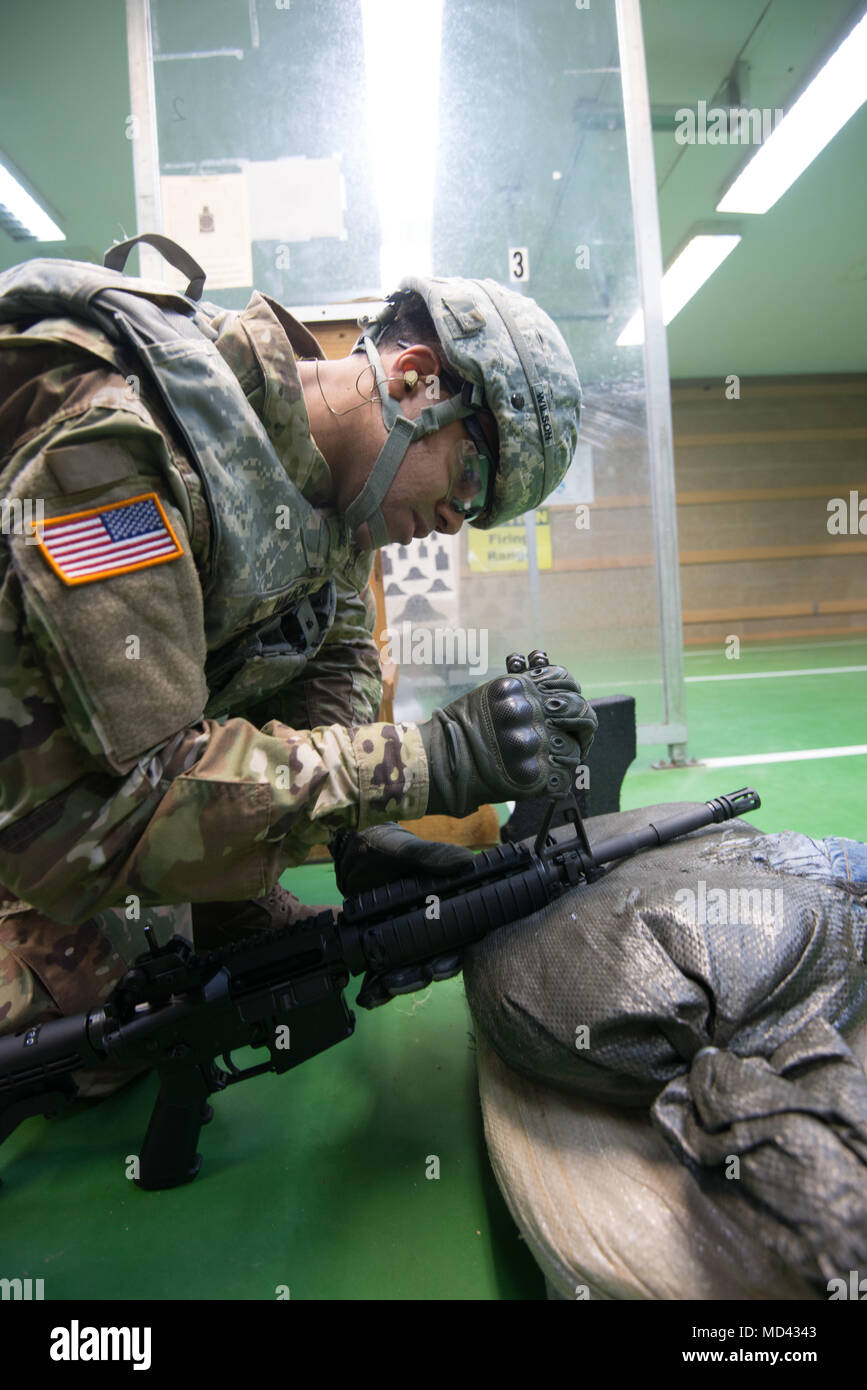 U.S. Army Sgt. Peter Wilson, assigned to the 102nd Strategic Signal ...