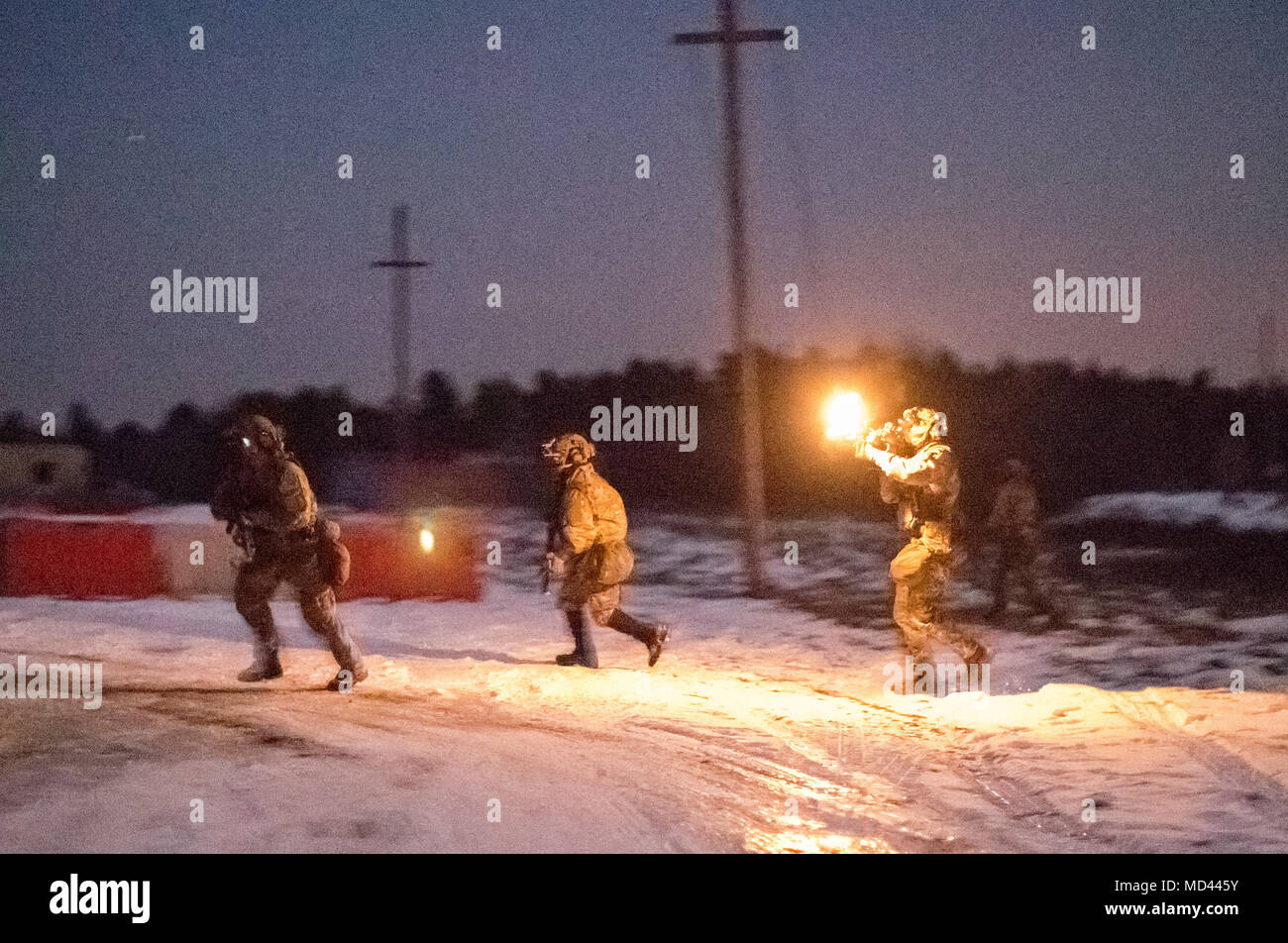 U.S. Army Rangers assigned to the 75th Ranger Regiment assault an ...