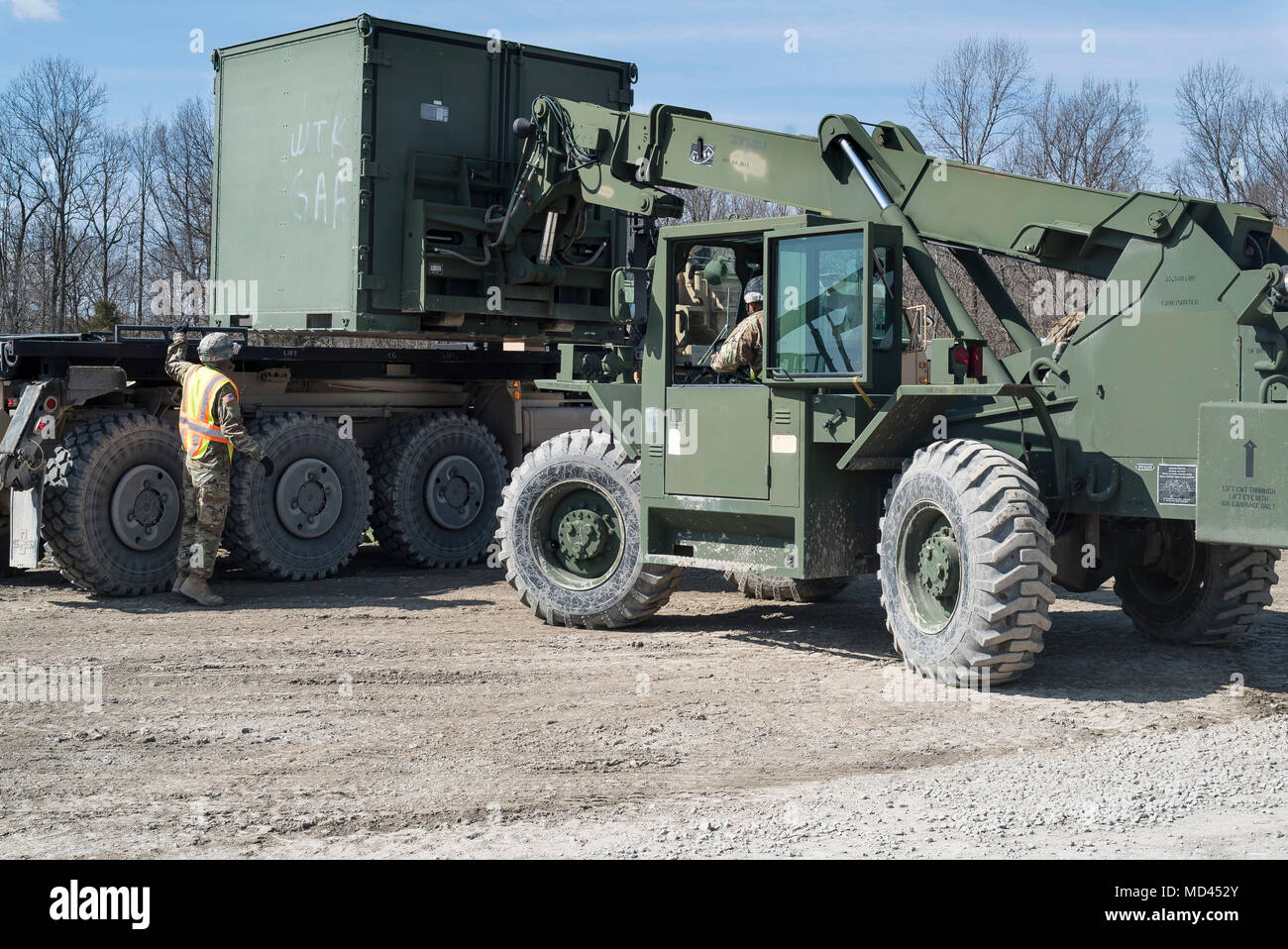 Sgt. Larry Anthony, with 302 ICTC, operates a 10k forklift to load ...