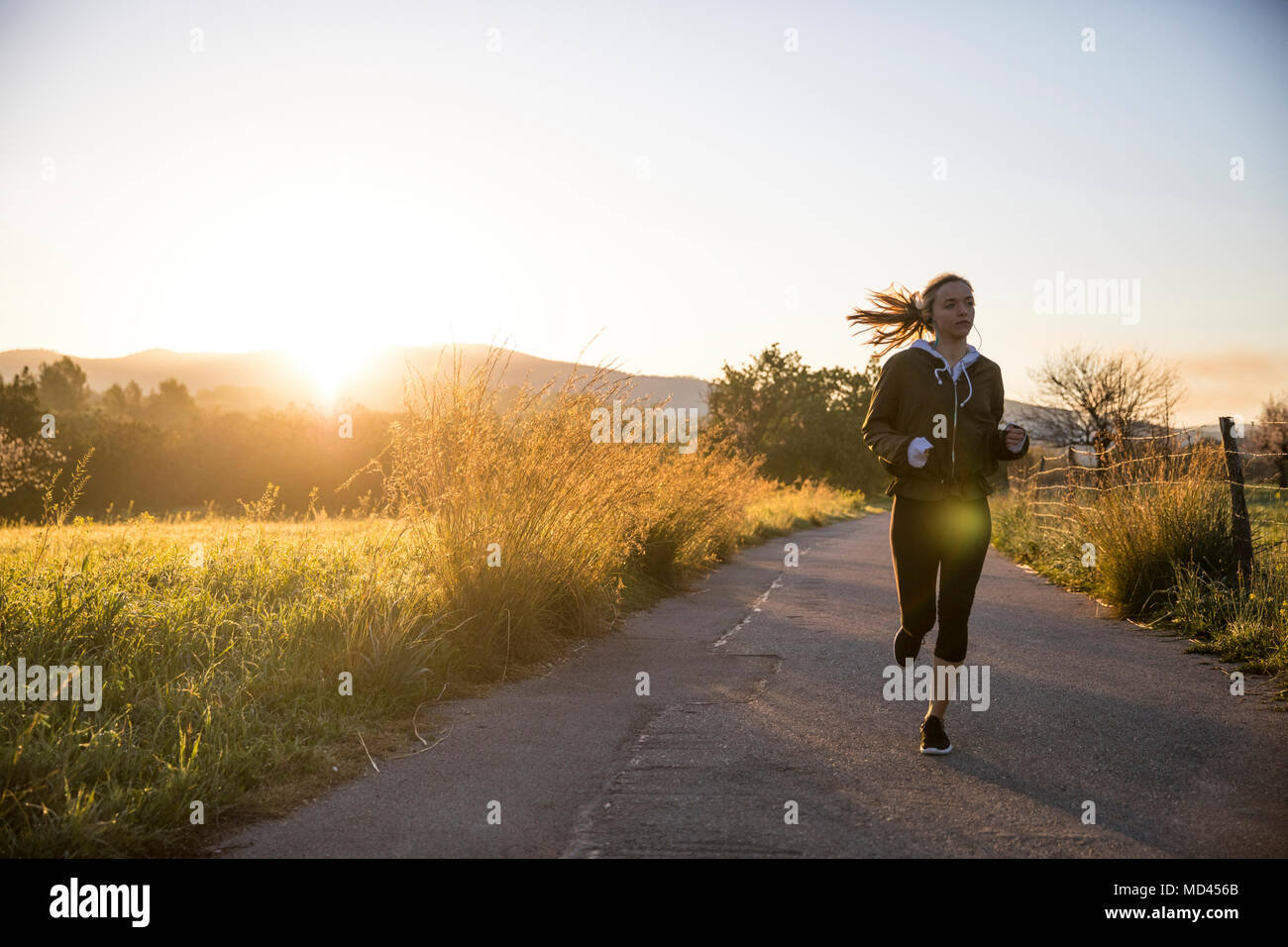Running training road hi-res stock photography and images - Alamy