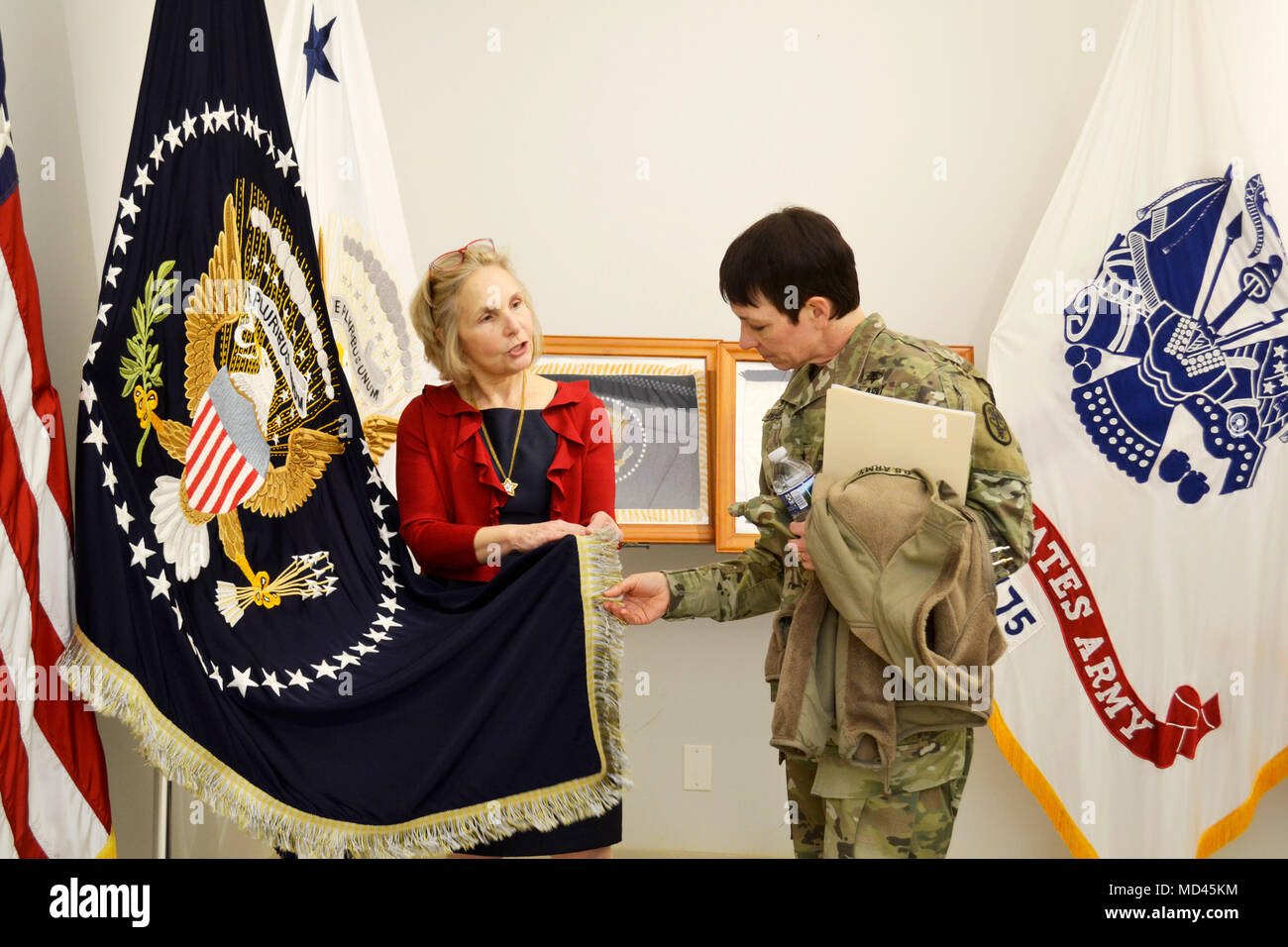 Linda Farrell, DLA Troop Support flag room supervisor, left, explains ...
