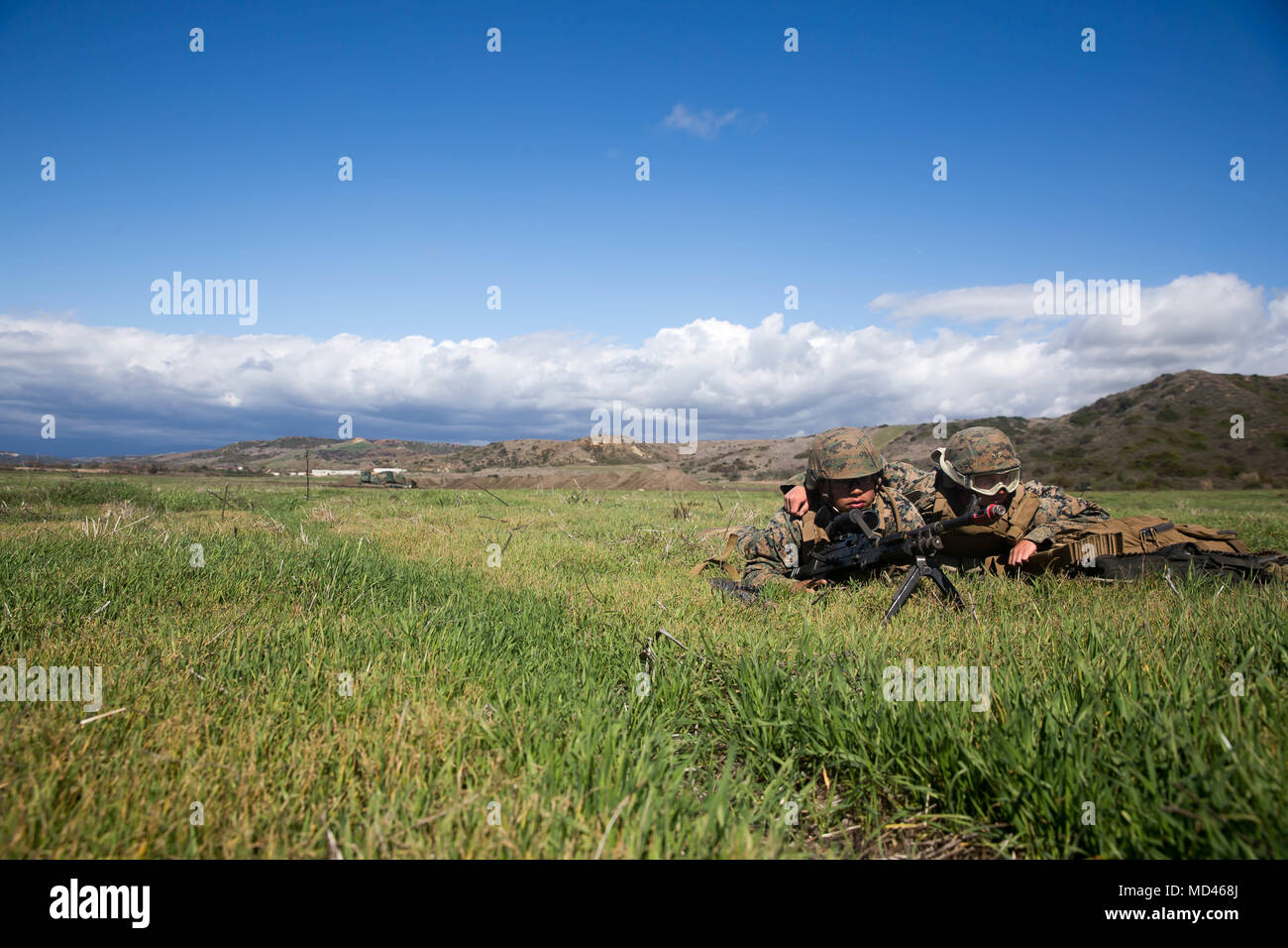 U.S. Marine Lance Cpl. Luis Manrique, left, and Lance Cpl. Evric Gray ...