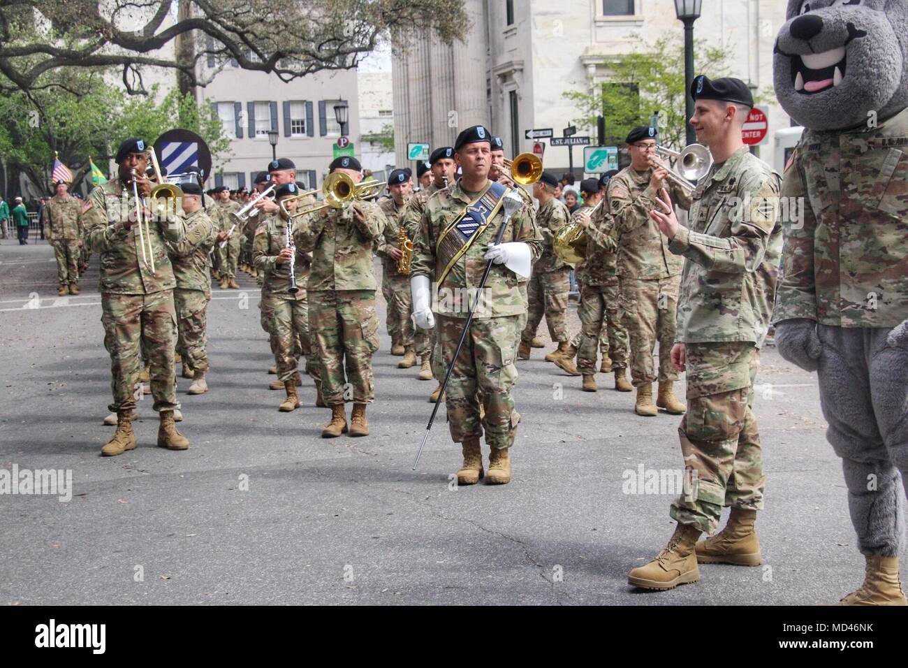 Soldiers with the 3rd Infantry Division band entertain the crowd while ...