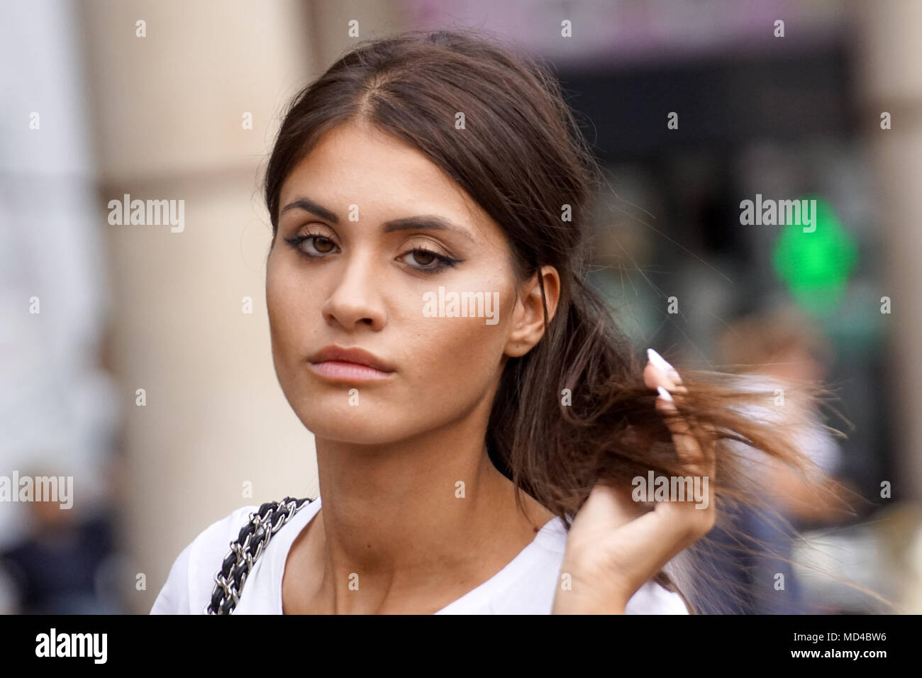 MILAN, ITALY - SEPTEMBER 22, 2017: Fashionable models poses on the ...