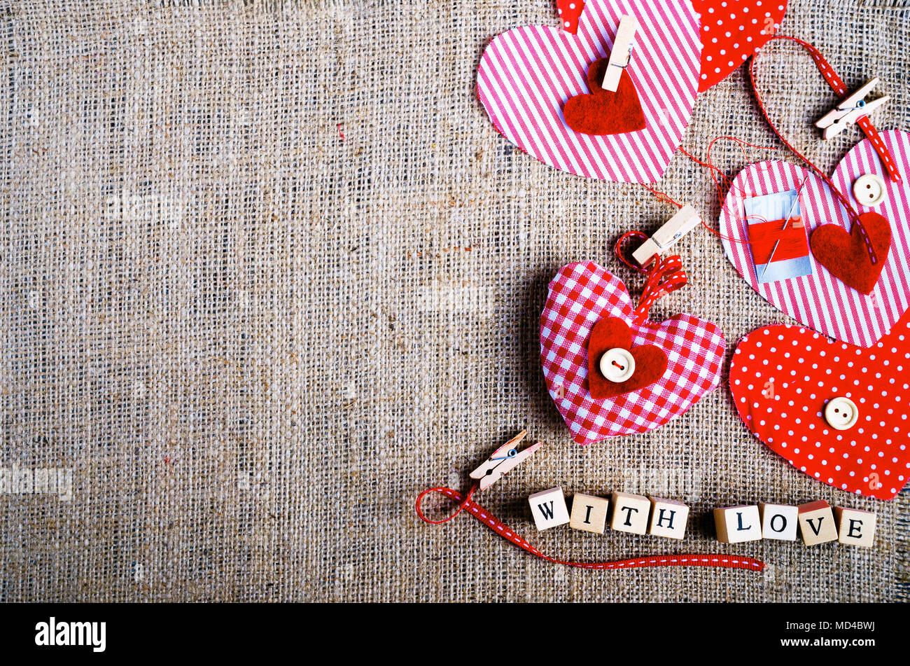 Sewing set: fabrics, threads, pins, buttons, tape and handmade hearts ...