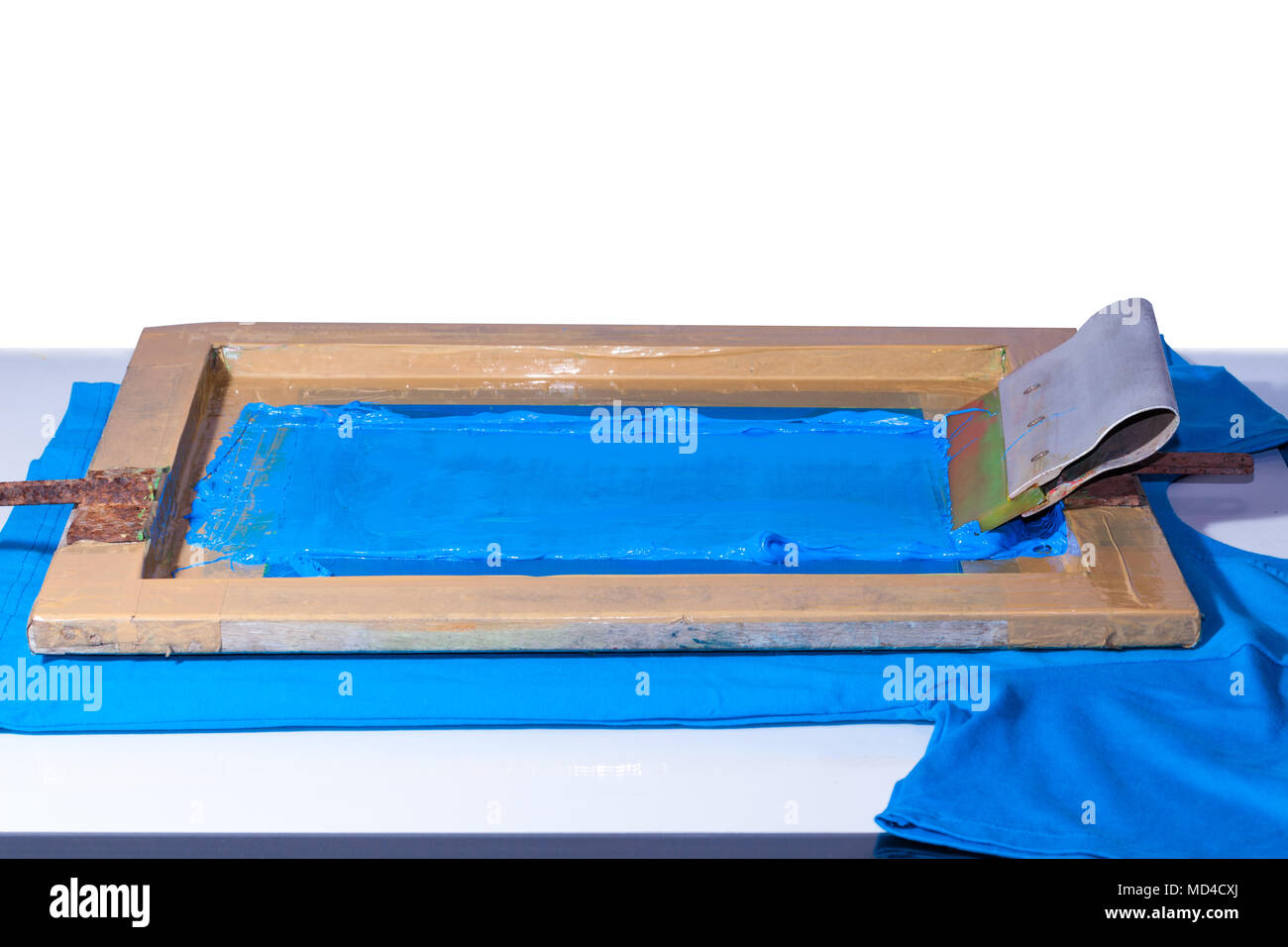 hand made screen printing with blue color print on blue tee shirt Stock ...