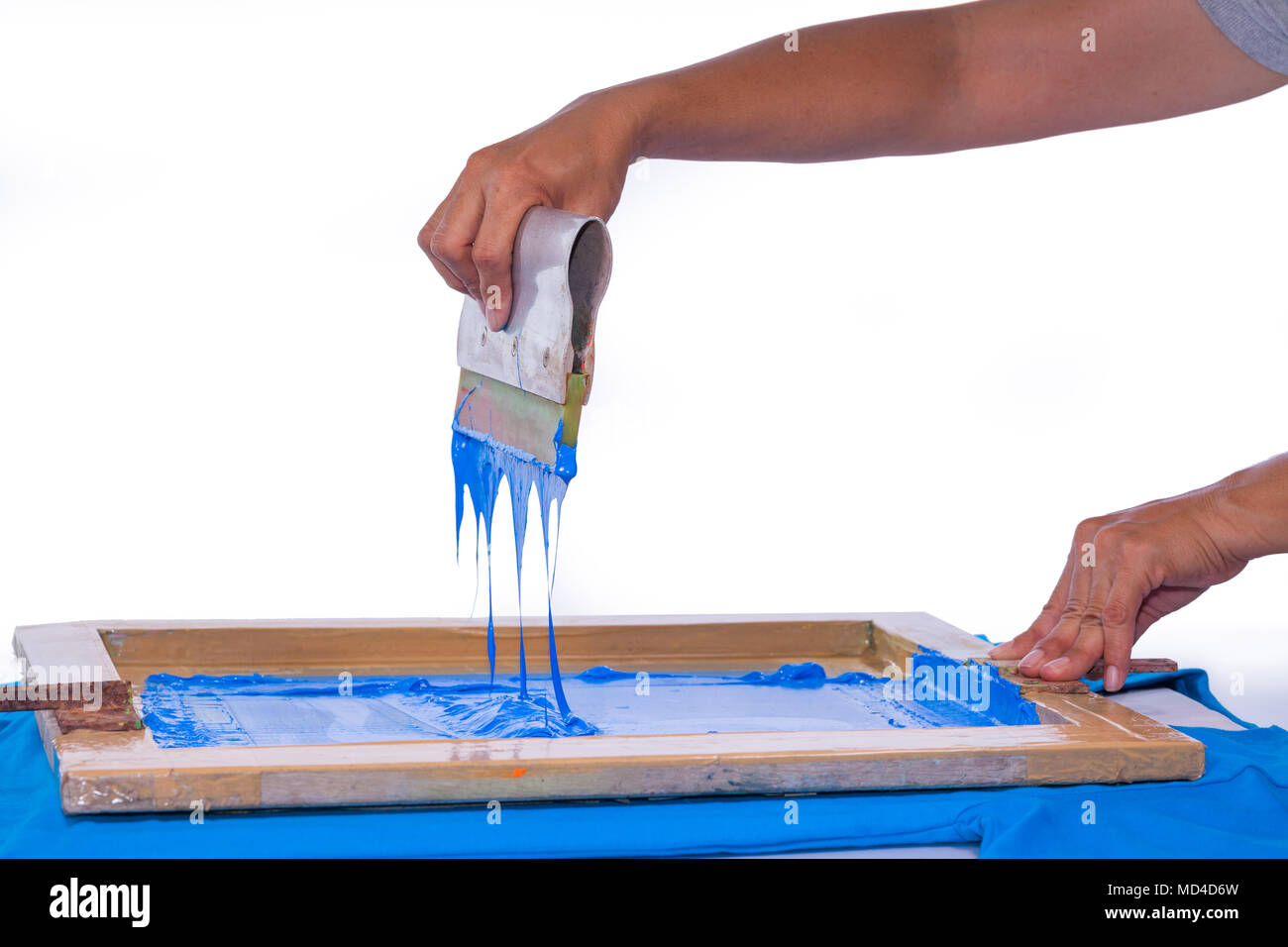 hand made screen printing with blue color print on blue tee shirt Stock ...