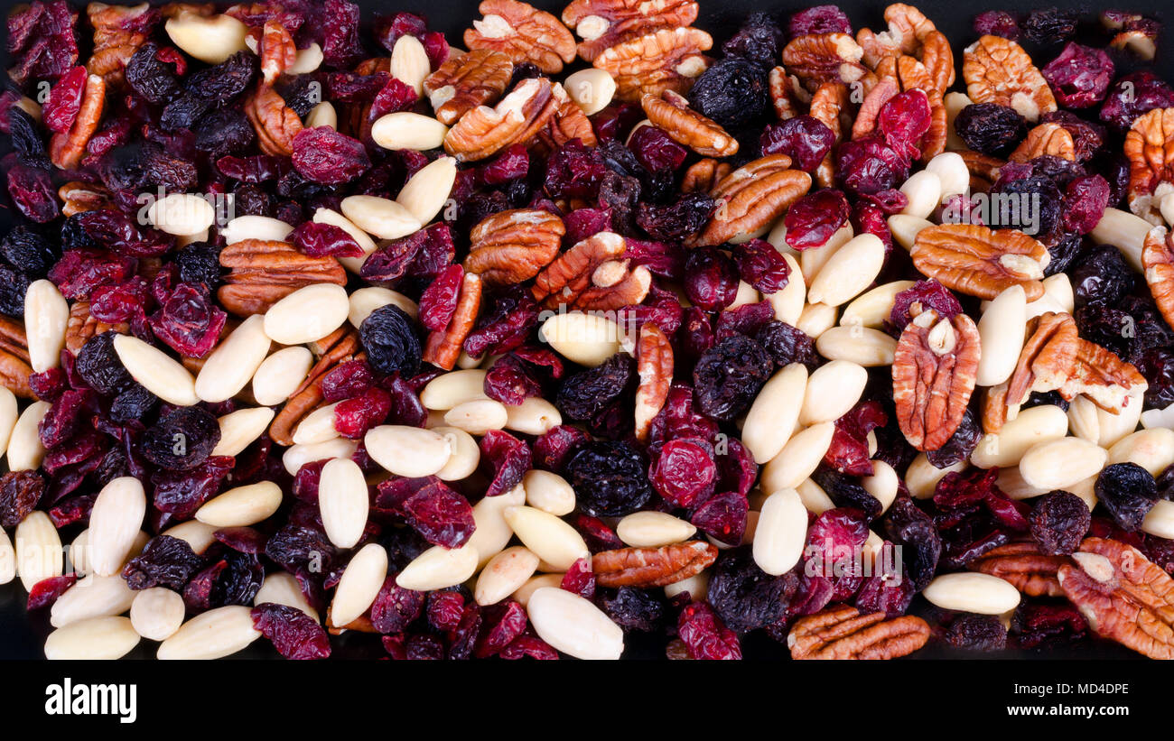 Dried fruits assortment on dark background, health food concept Stock ...