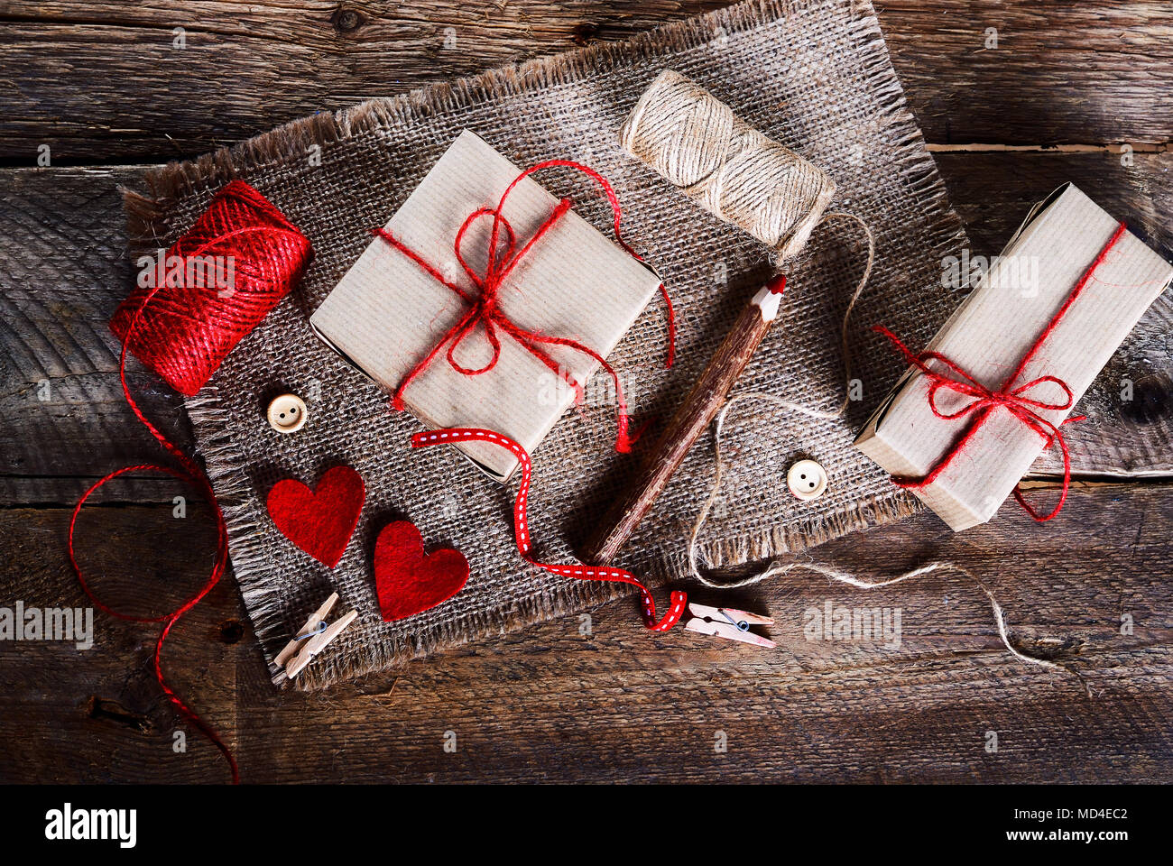 Vintage gift box package with blank gift tag on old wooden background ...