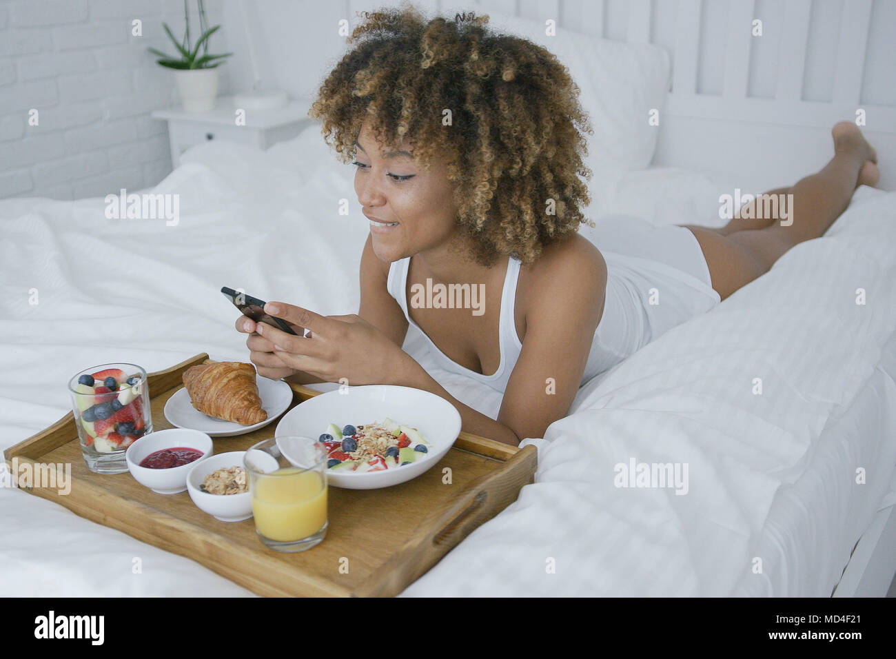 Meal in bed hi-res stock photography and images - Alamy