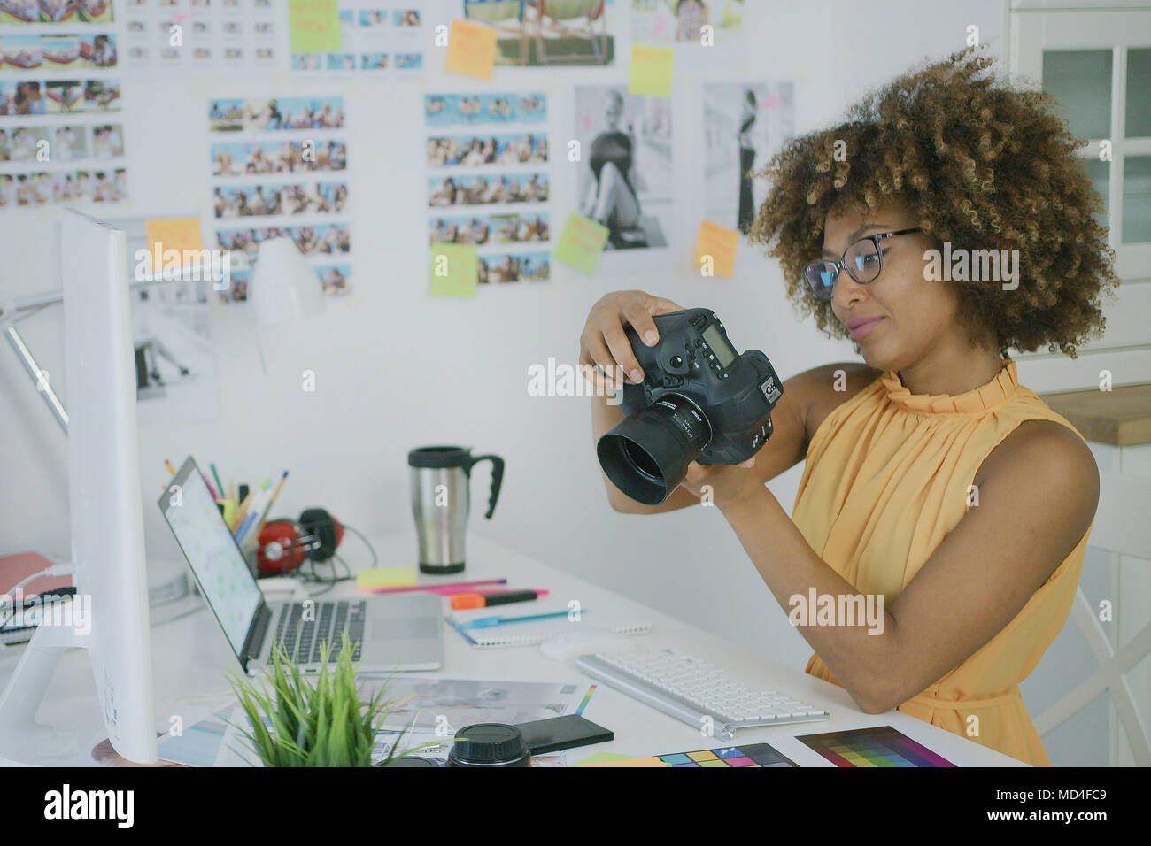 Professional photographer working photos table hi-res stock photography ...