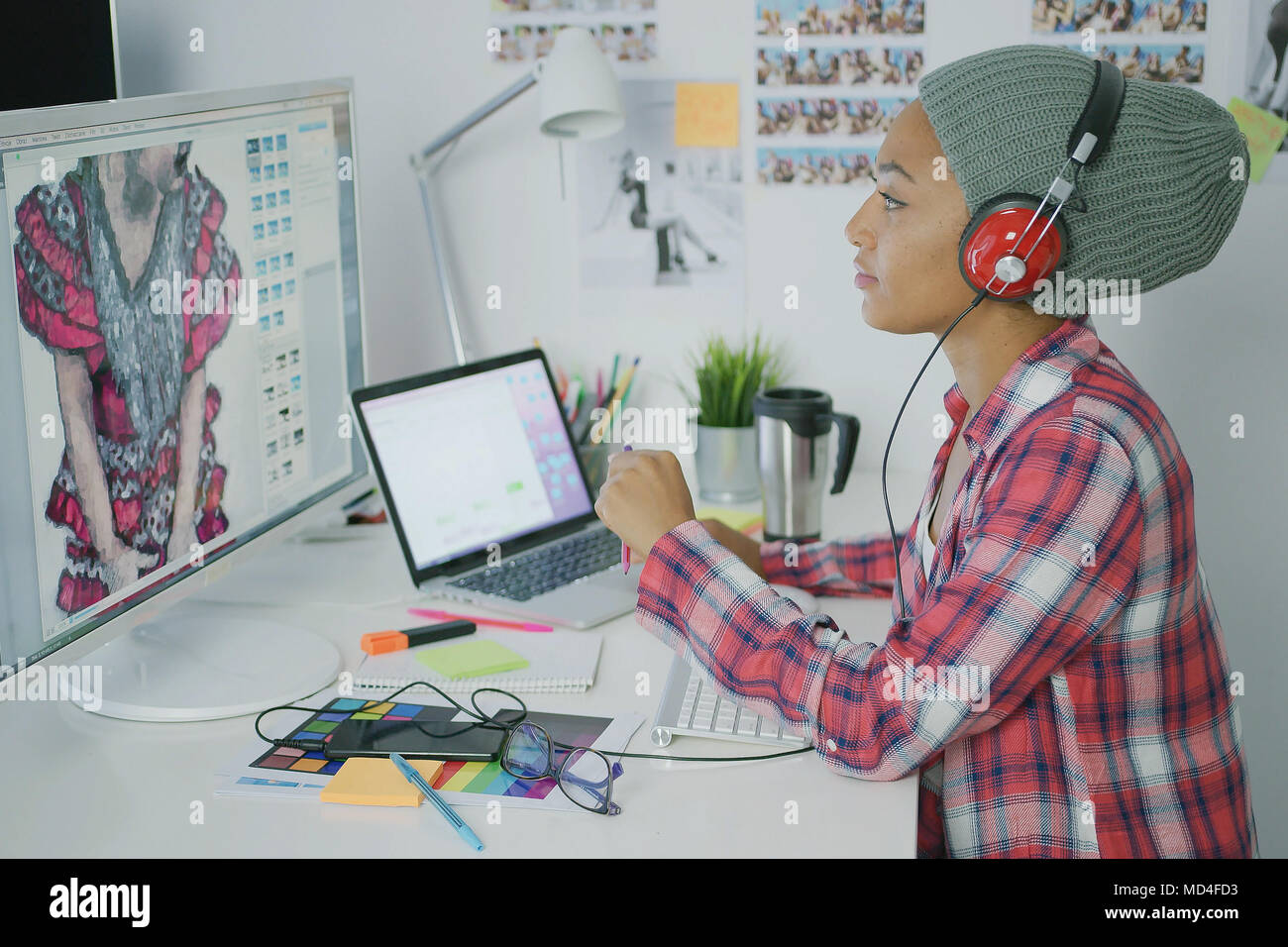 Trendy designer working with computer Stock Photo - Alamy