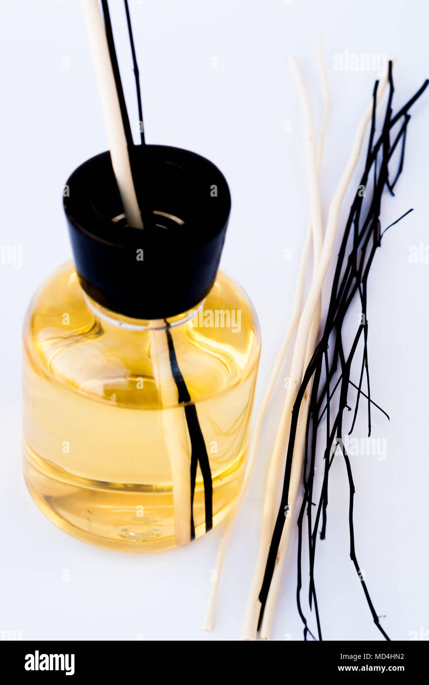 Essential Oil with Black and White Reed Diffusers Stock Photo - Alamy