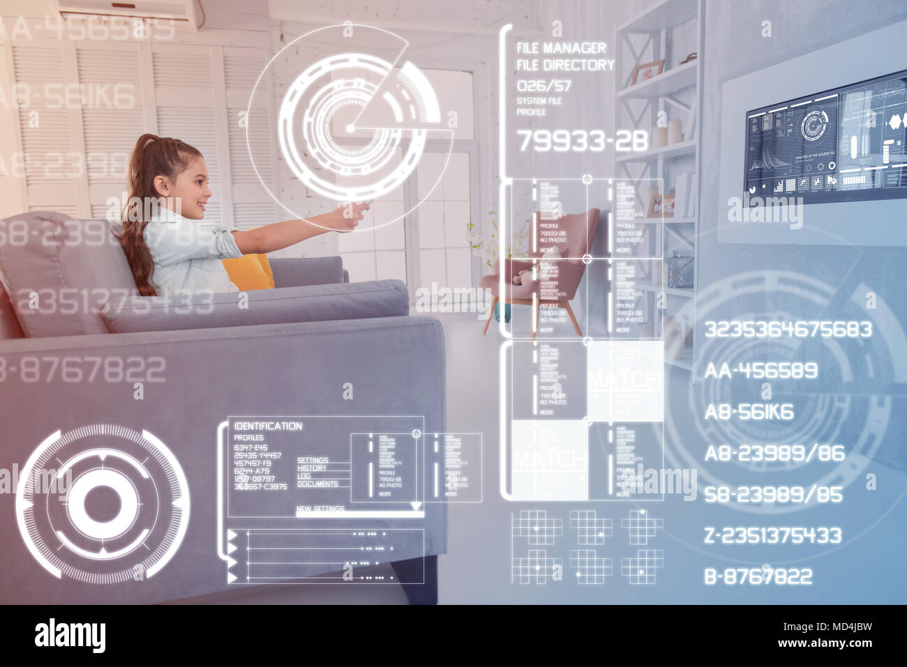 Happy child watching TV and smiling while switching the channels Stock ...