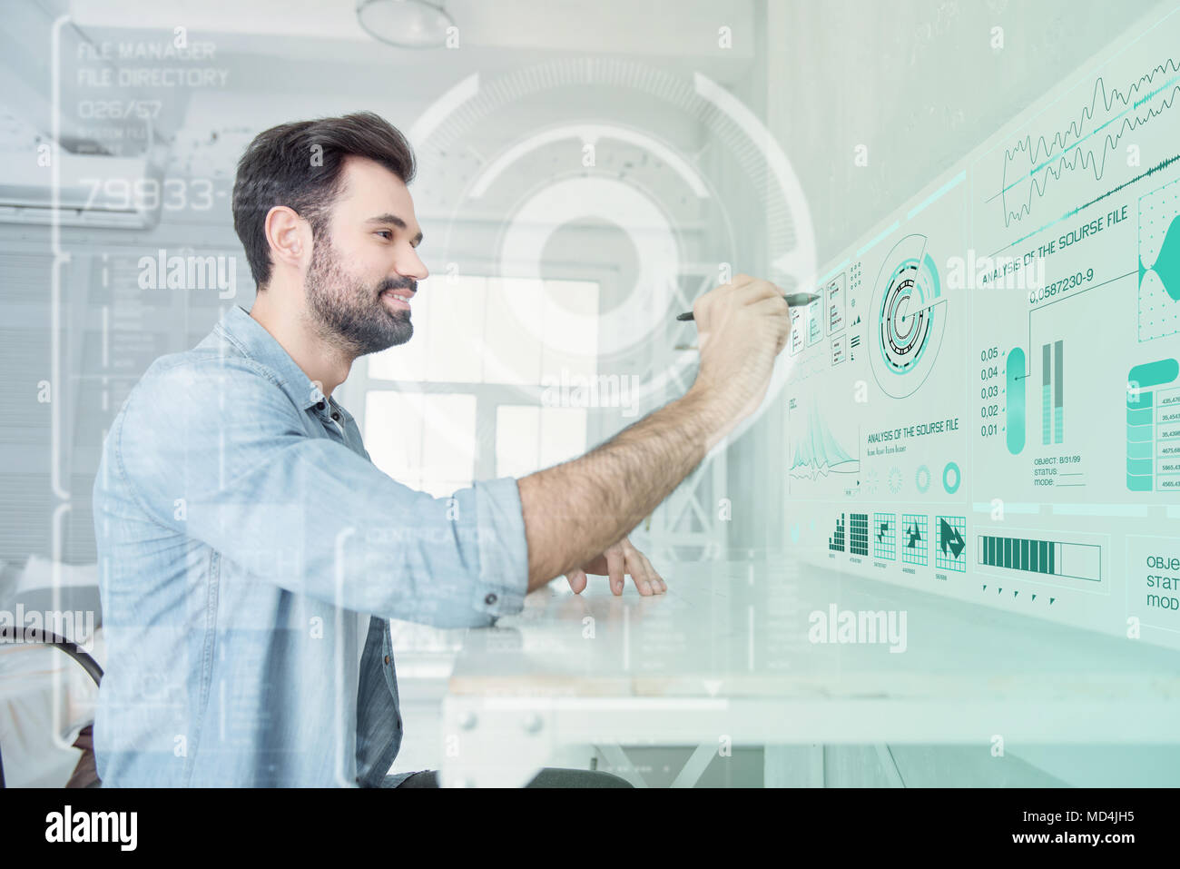 Talented programmer drawing diagrams while testing his program Stock ...