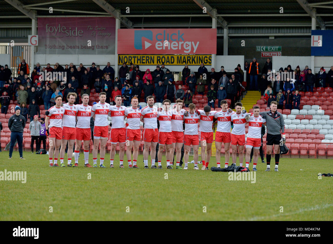 Members of the Derry GAA football senior team stand for the Irish ...