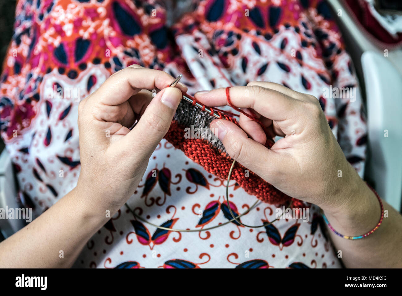 girl hands while knitting Stock Photo - Alamy