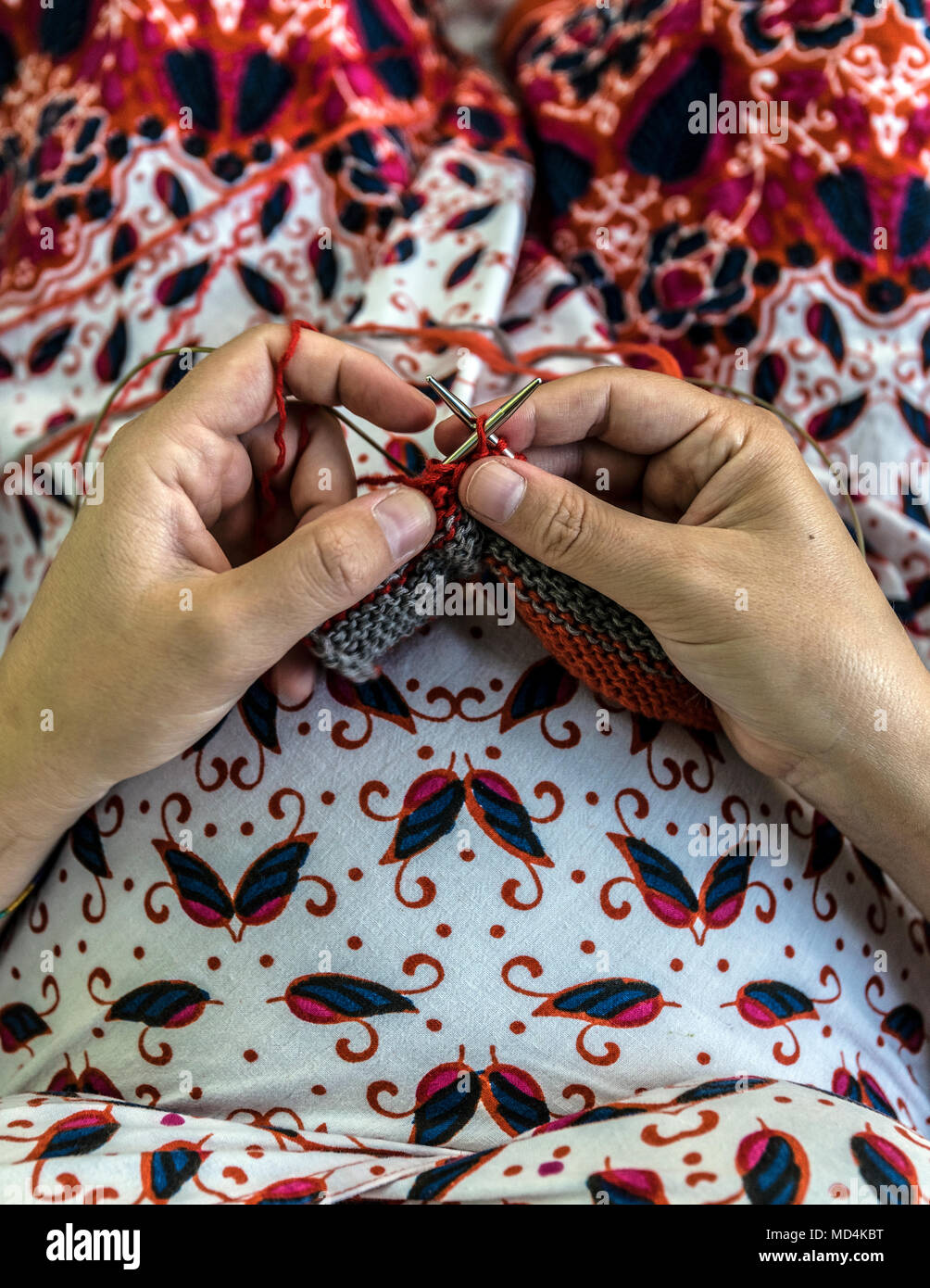 girl hands while knitting Stock Photo - Alamy