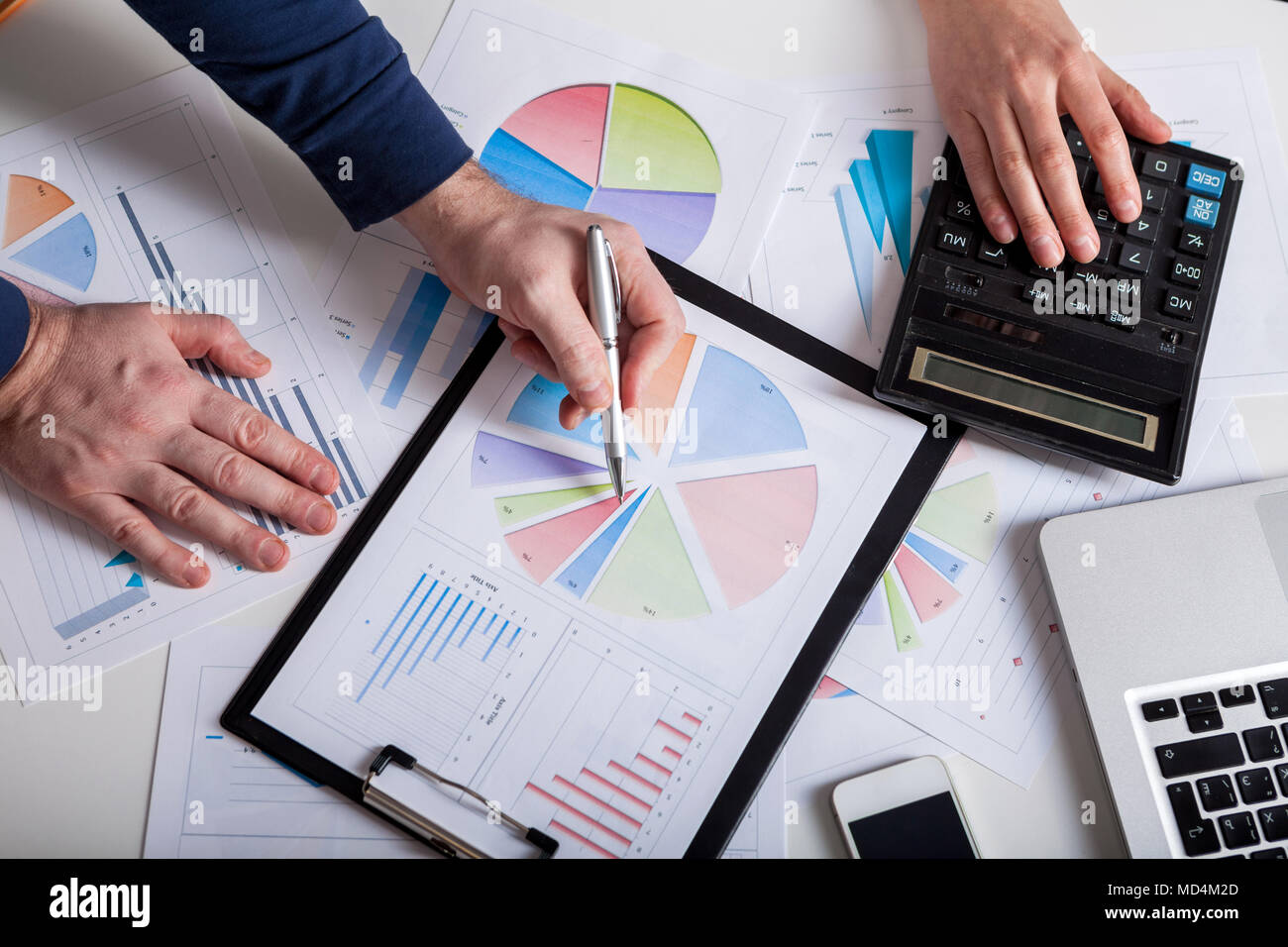 Stock market chart and finger pointing Stock Photo - Alamy