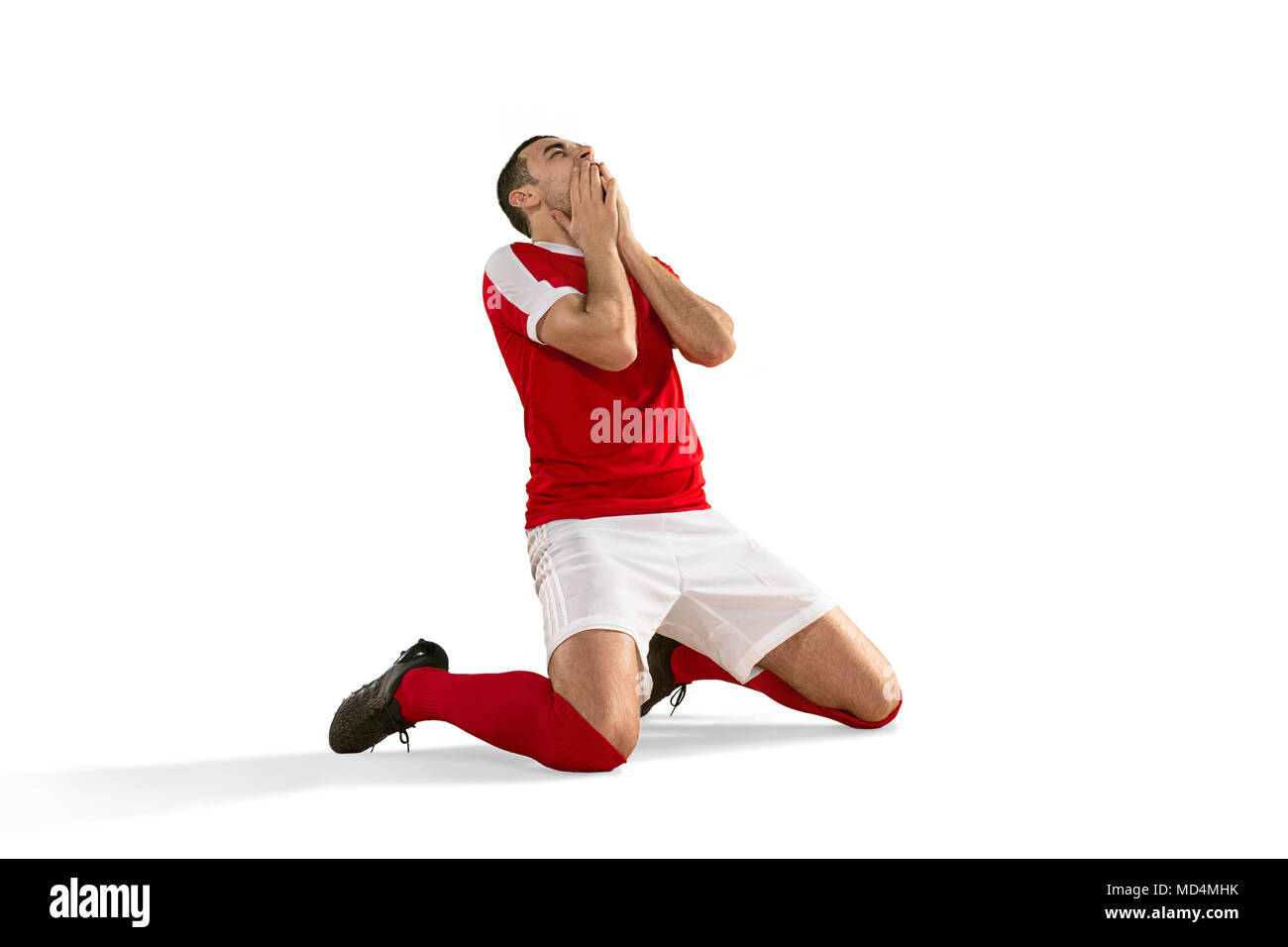 unhappy soccer or football player with palm on his face Stock Photo - Alamy
