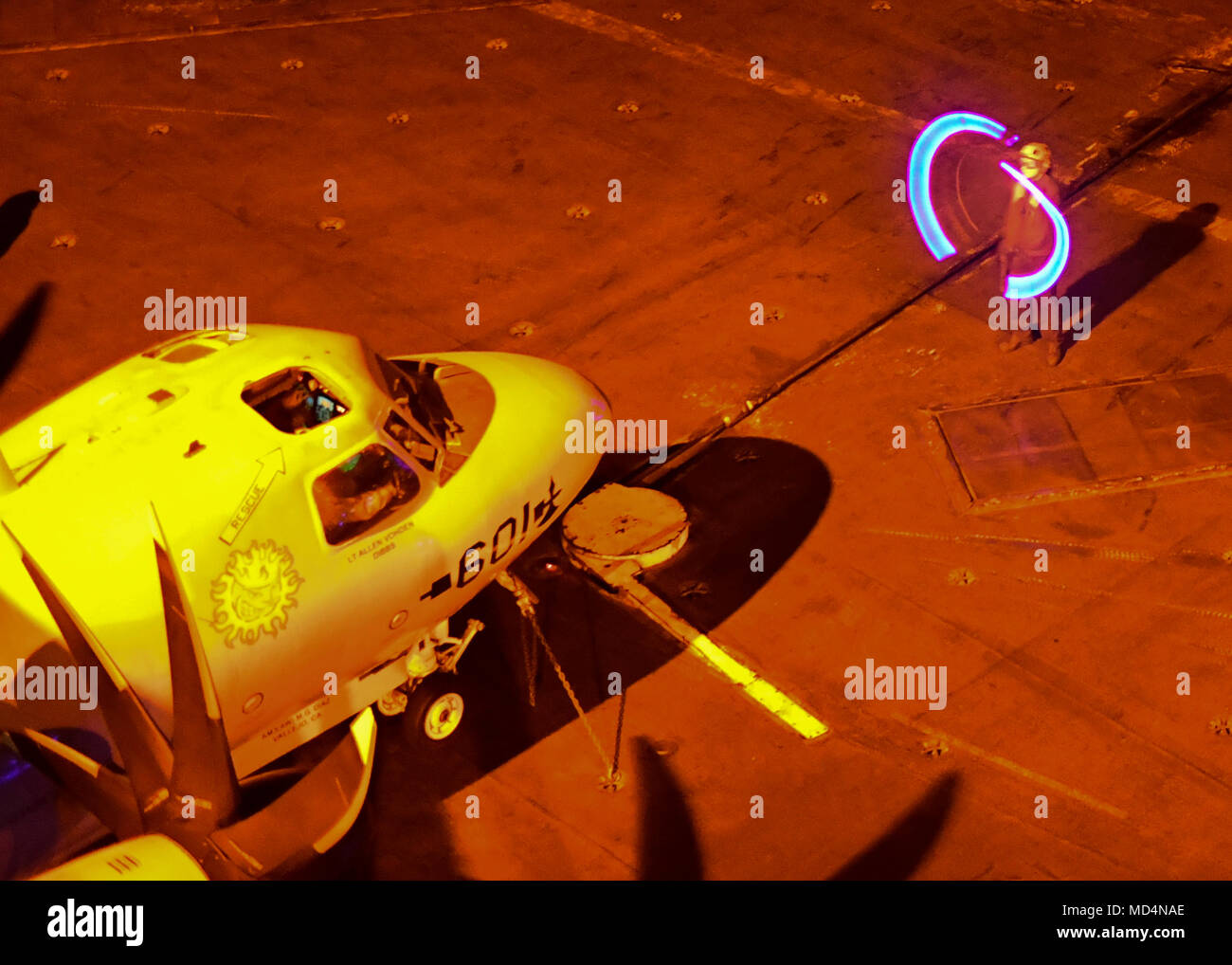 180319-N-NK192-1002 ARABIAN GULF (March 20, 2018) A Sailor directs ...