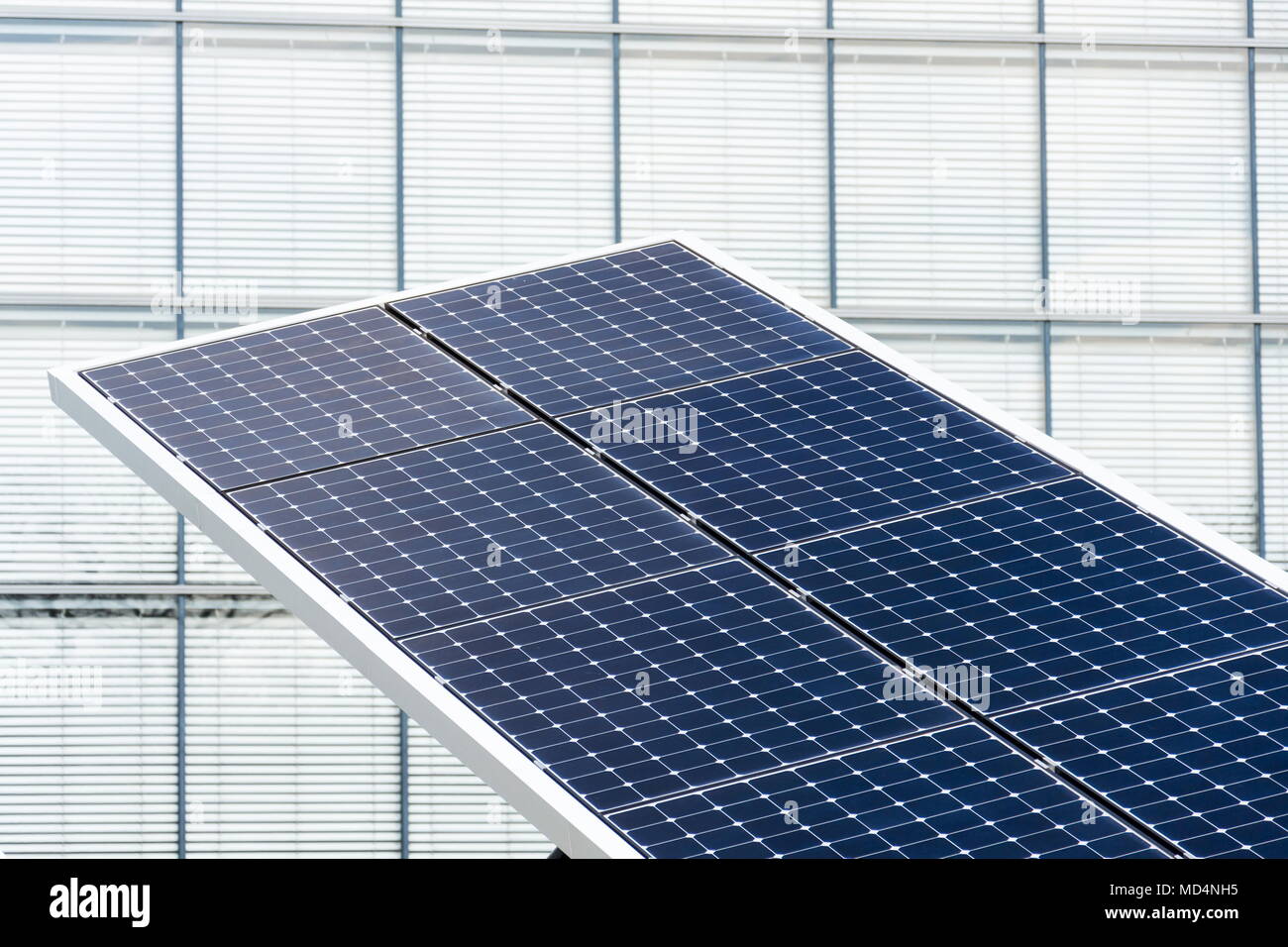 Blue rotating solar panels tilted axis tracker, future energy concept ...
