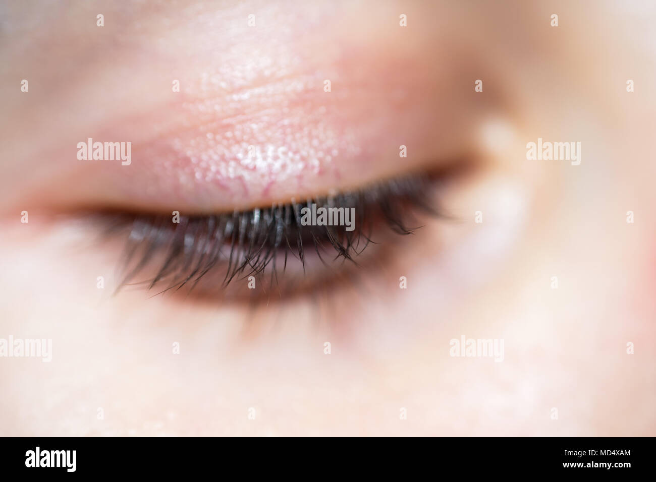 Woman with long eyelashes hi-res stock photography and images - Alamy