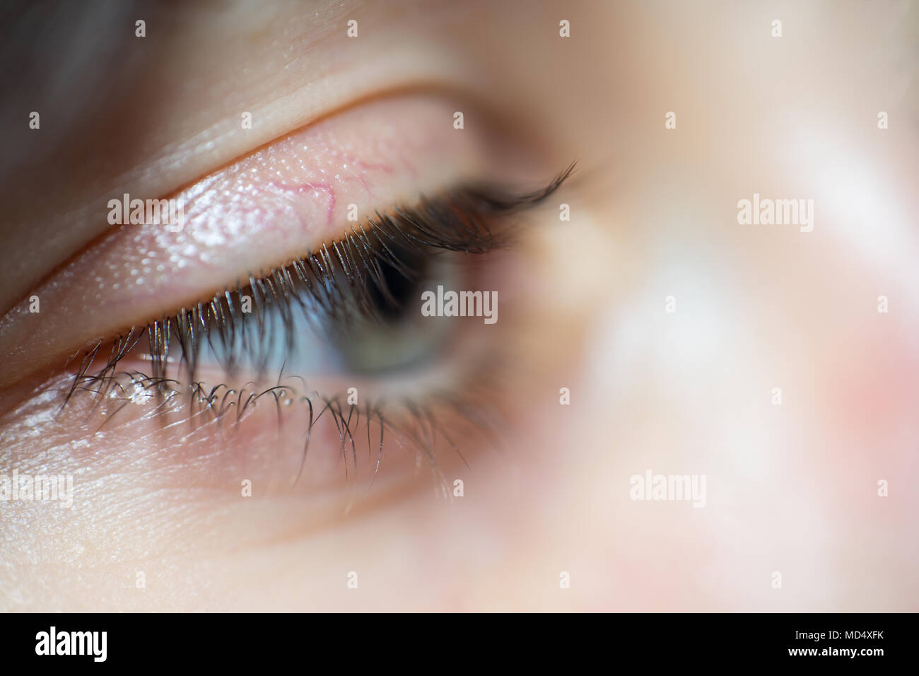 Sad Blue Eyes With Tears