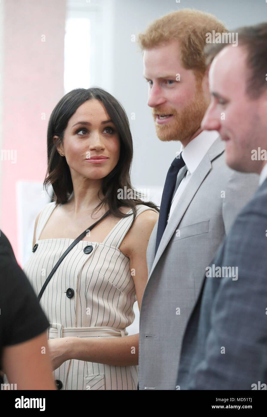 Meghan Markle looks at Prince Harry during a reception for delegates ...