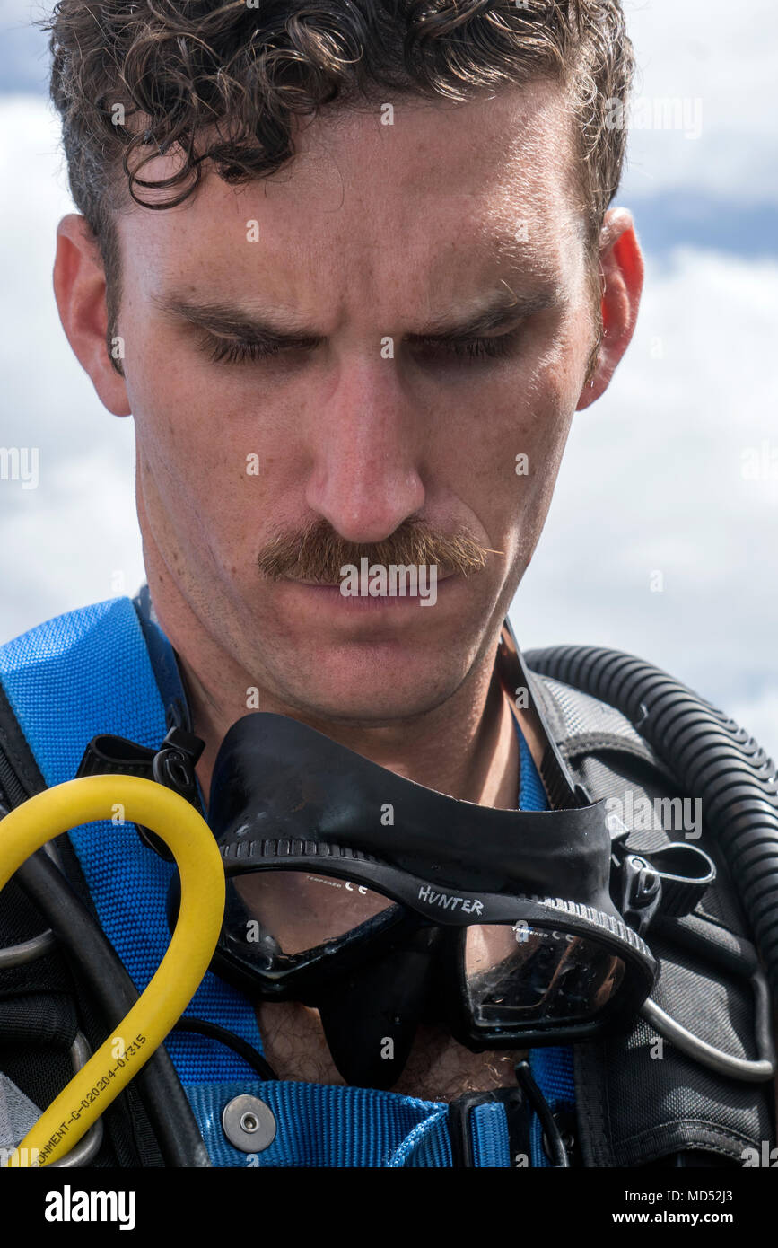Navy Diver 2nd Class David Lang, assigned to the Naval Base Guam Dive ...