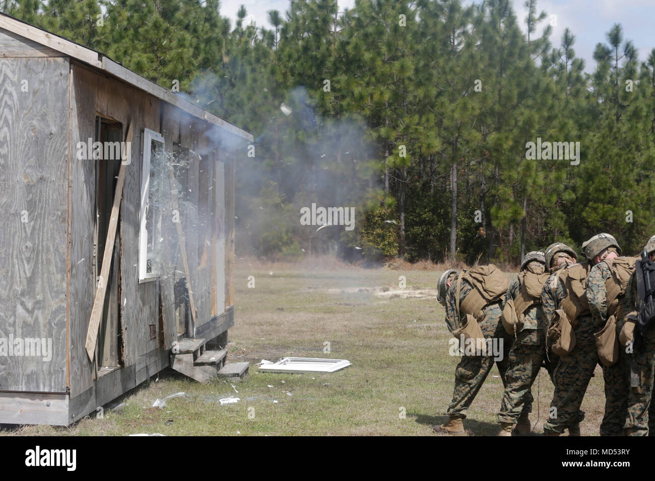 U.S. Marines from different units detonate a window charge during an ...