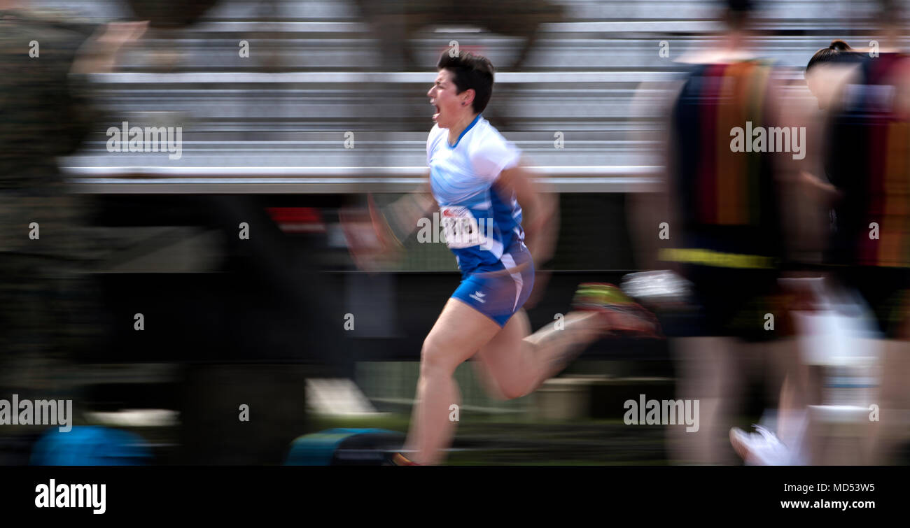 French athlete Audrey Mallet screams as she runs down the track during ...