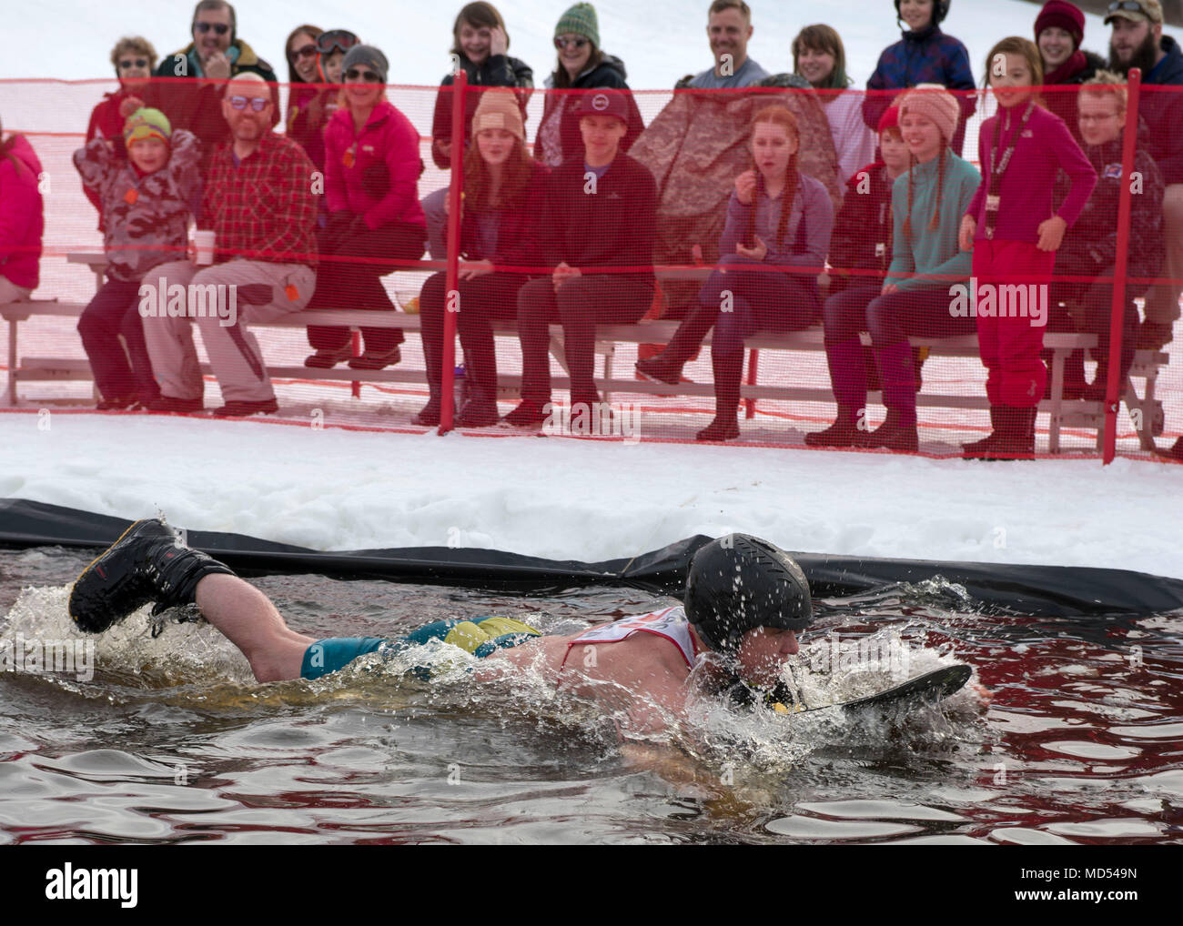 Ross Funches, a participant of the 2018 Slush Cup, swims to the finish ...