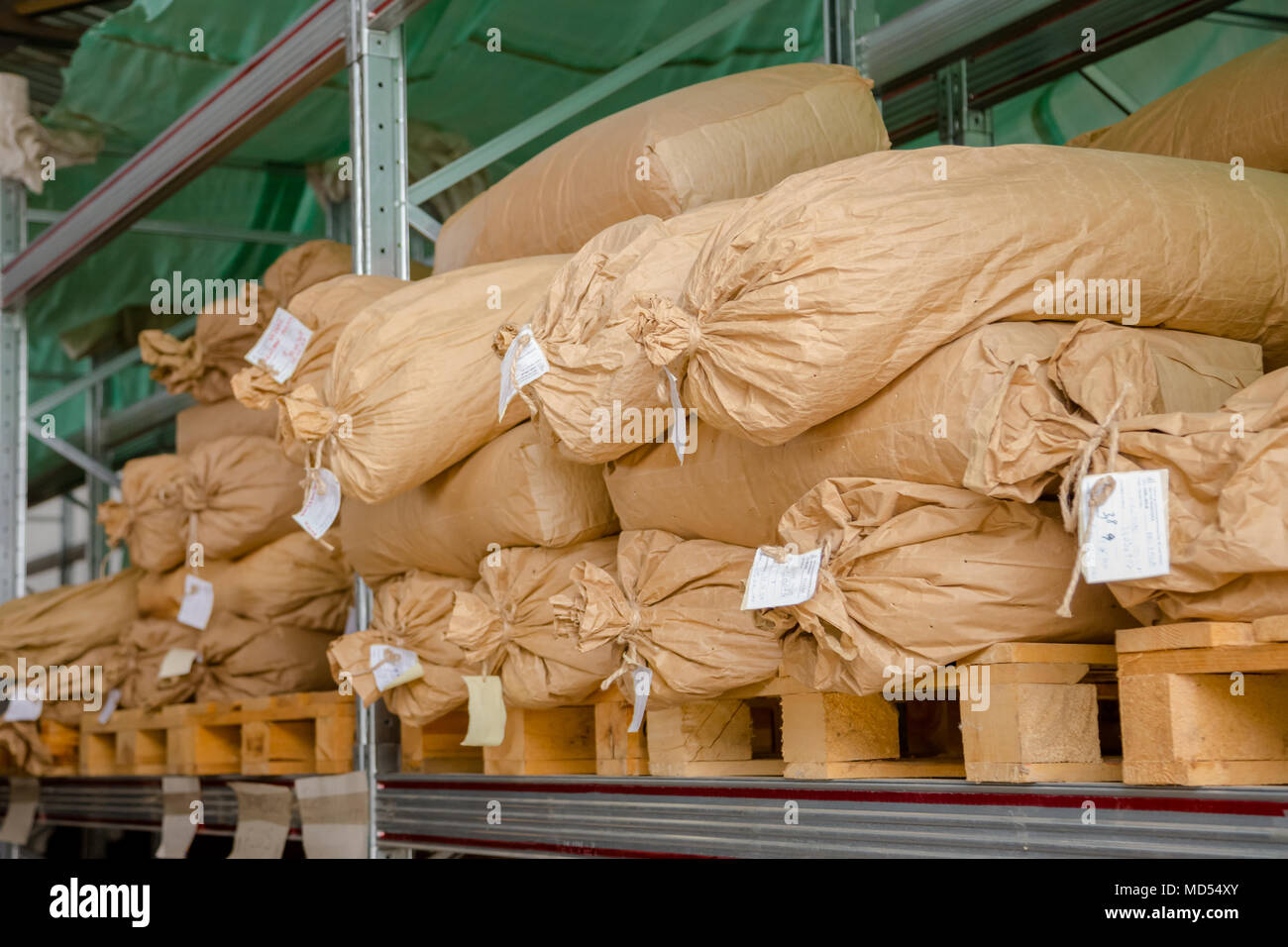 Old paper sacks placed in warehouse stacking before export Stock Photo ...