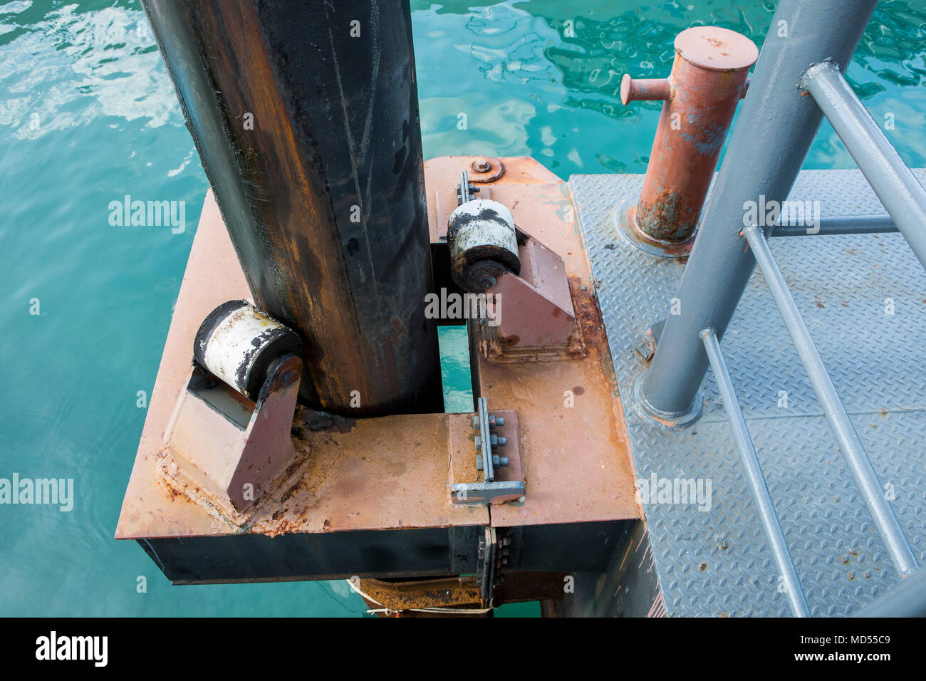 metal work of floating sea pier pole Stock Photo - Alamy