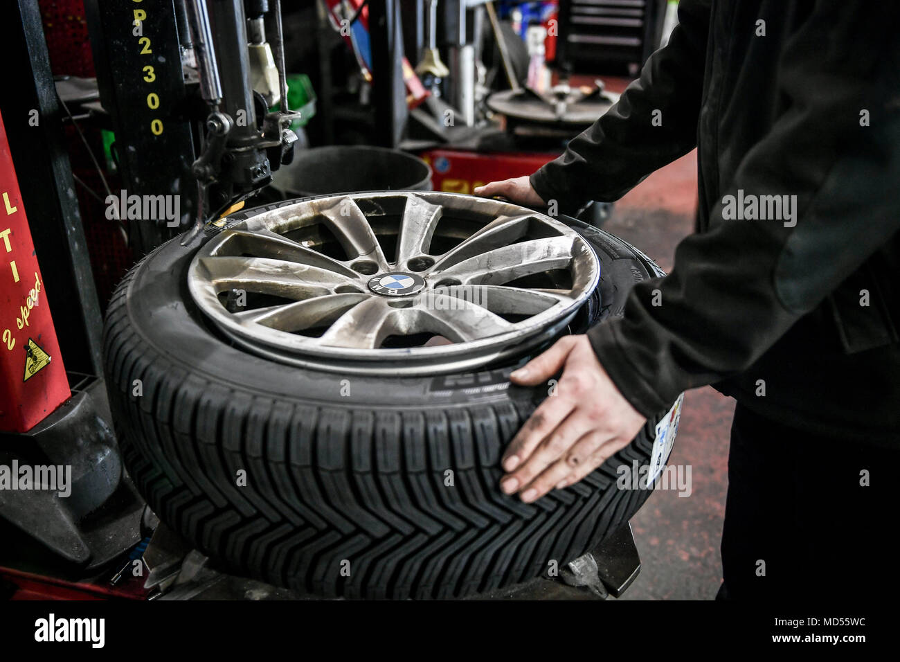 A car tyre in a garage Stock Photo - Alamy
