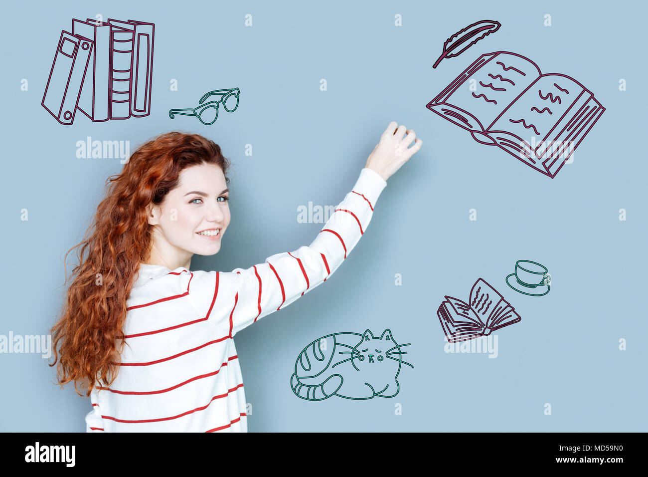 Creative author looking inspired while writing a new book Stock Photo ...