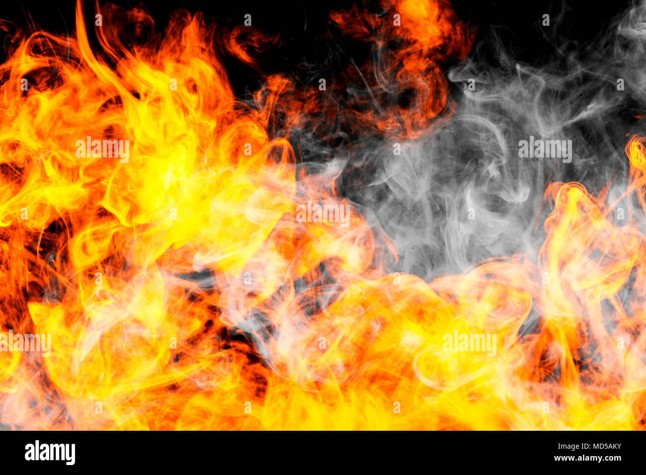 Fire flames background. Colorful fiery smoke on a black isolated ...