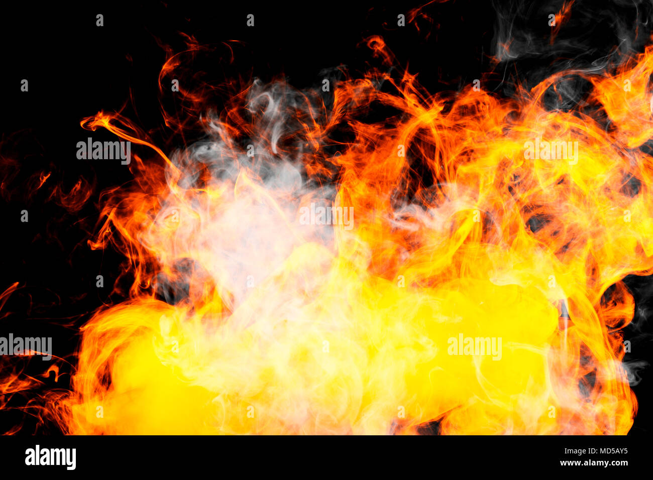Fire flames background. Colorful fiery smoke on a black isolated ...