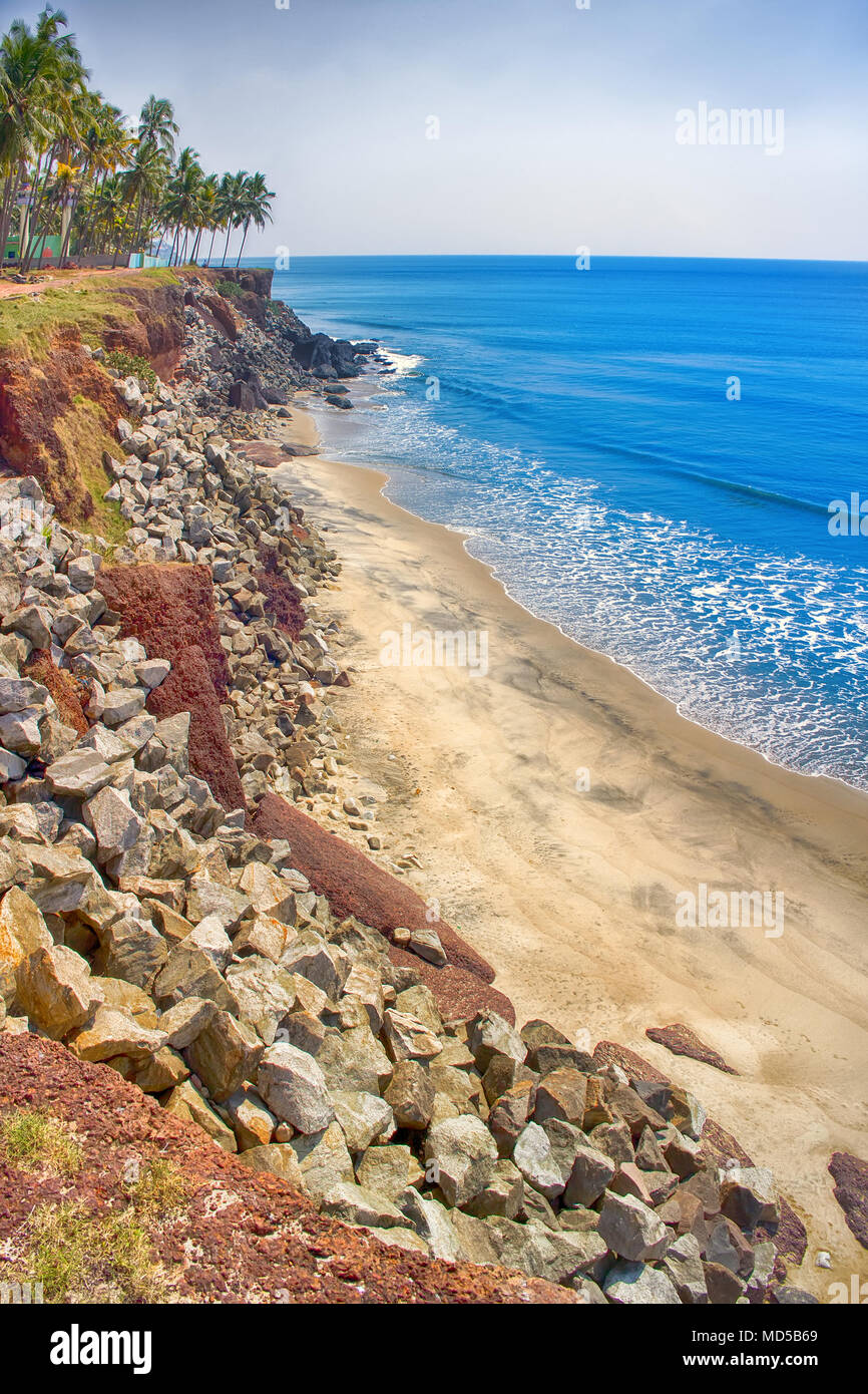 Arabian sea in Kerala. Picturesque cliffs, beaches and palm groves ...