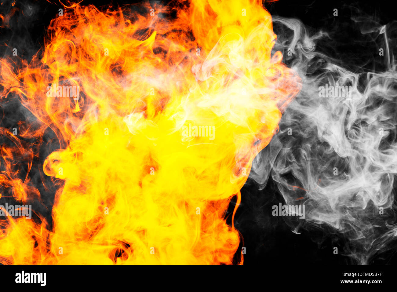 Fire flames background. Dense fiery smoke on a black isolated ...