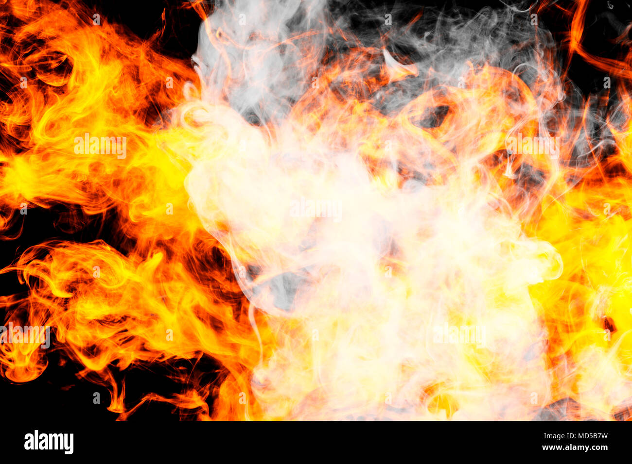 Fire flames background. Dense fiery smoke on a black isolated ...