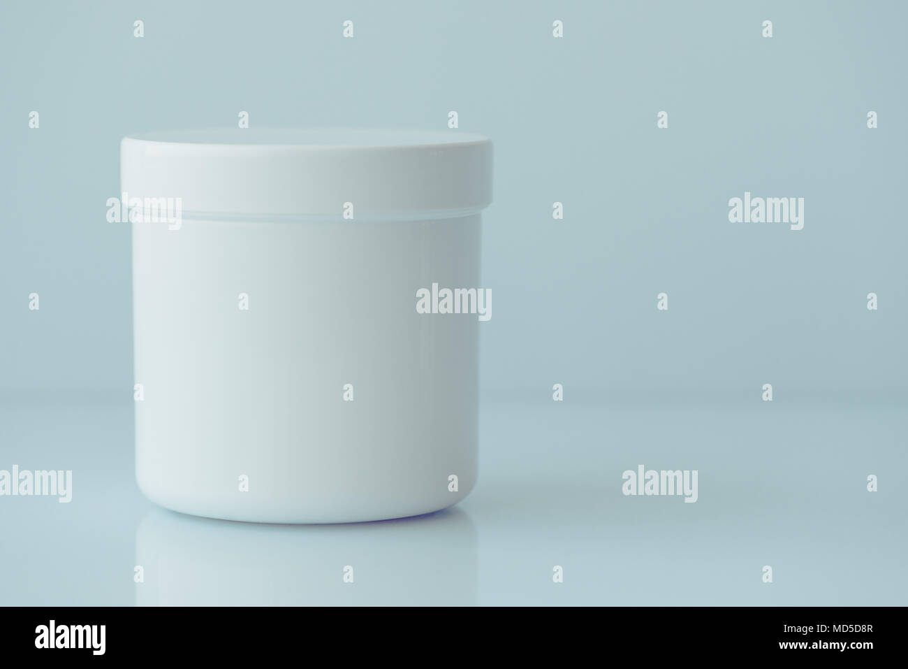 Cosmetic cream plastic jar with blank surface as copy space ...