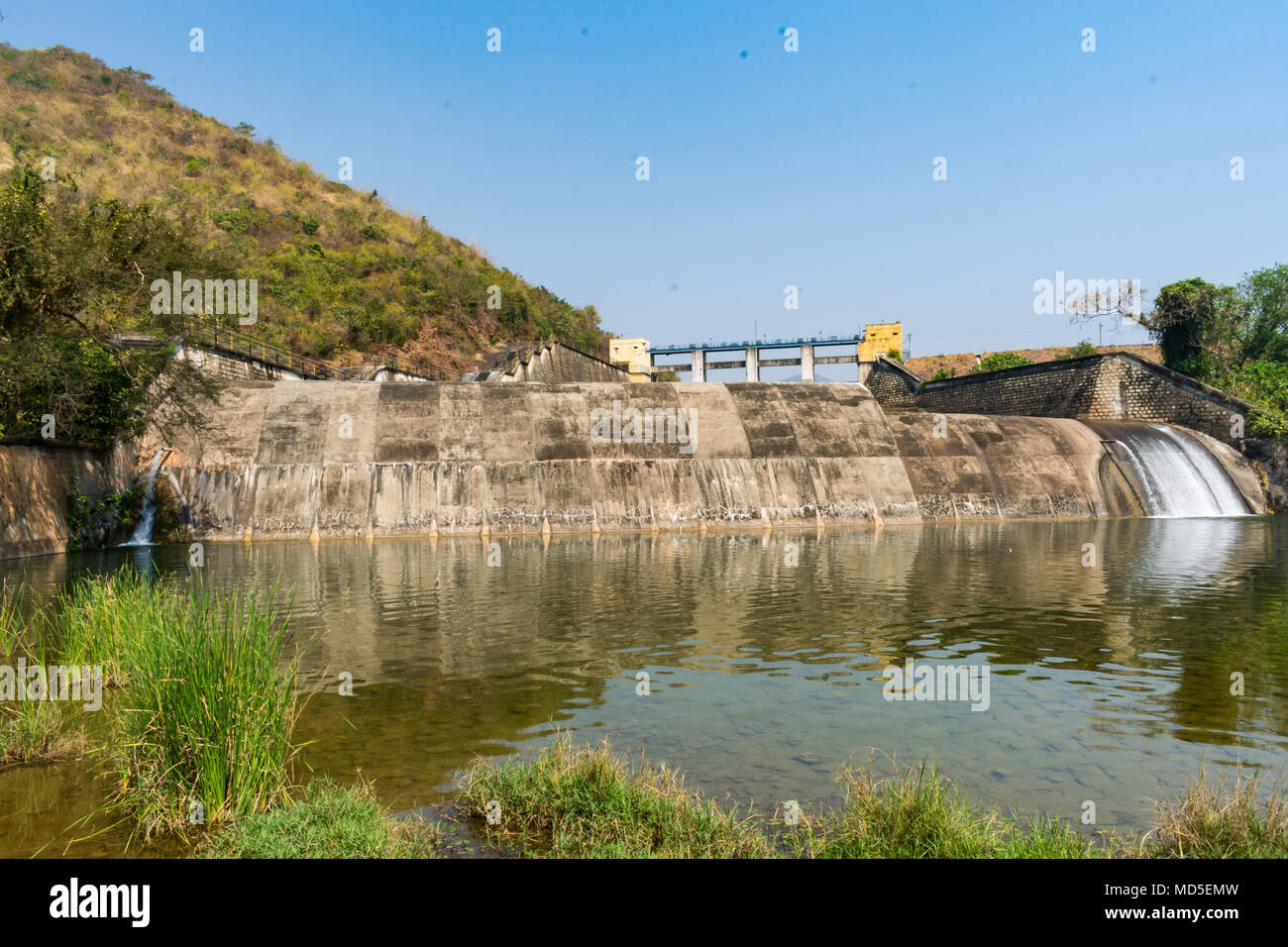 Indian dam with flowing water from reservoir. This dam is famous for ...