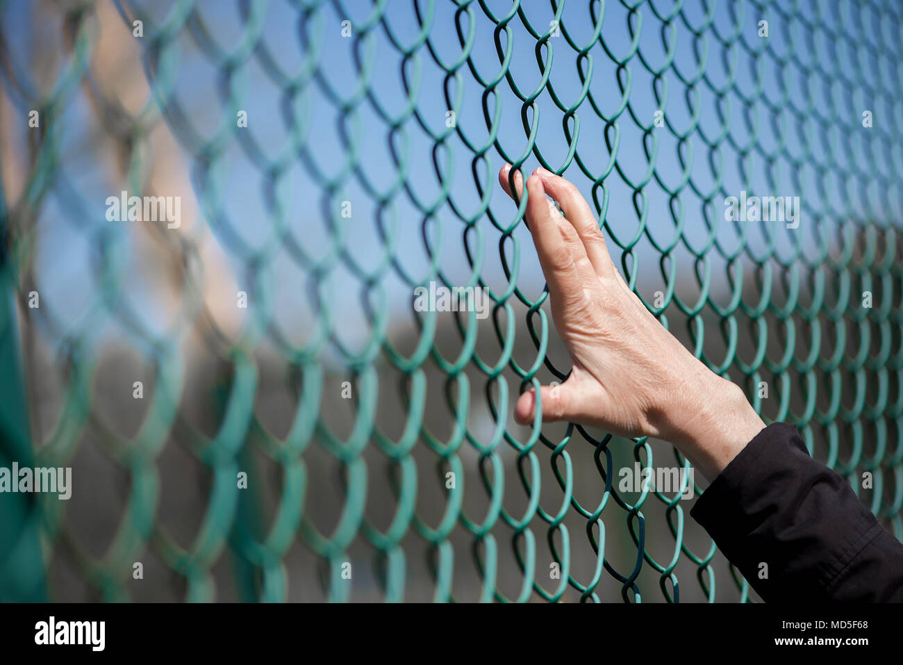 Hand chain link fence hi-res stock photography and images - Alamy