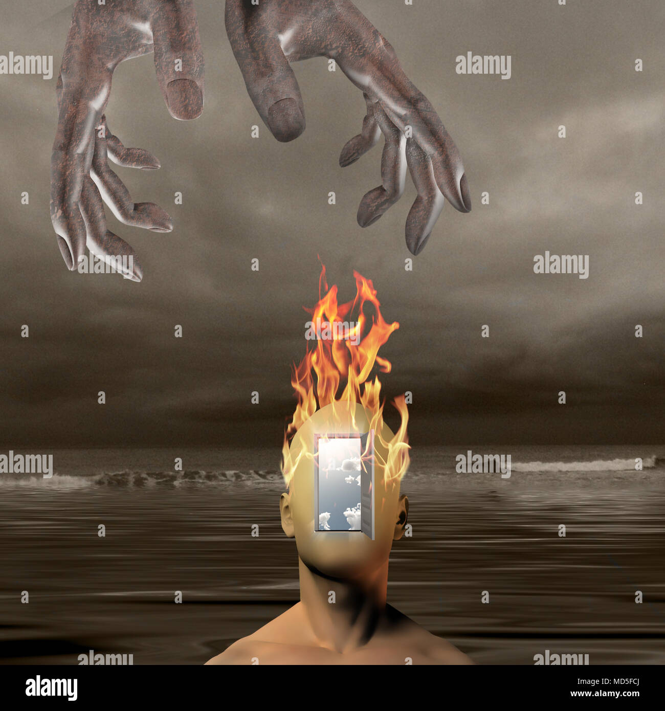 Burning human head with dark sea background Stock Photo - Alamy