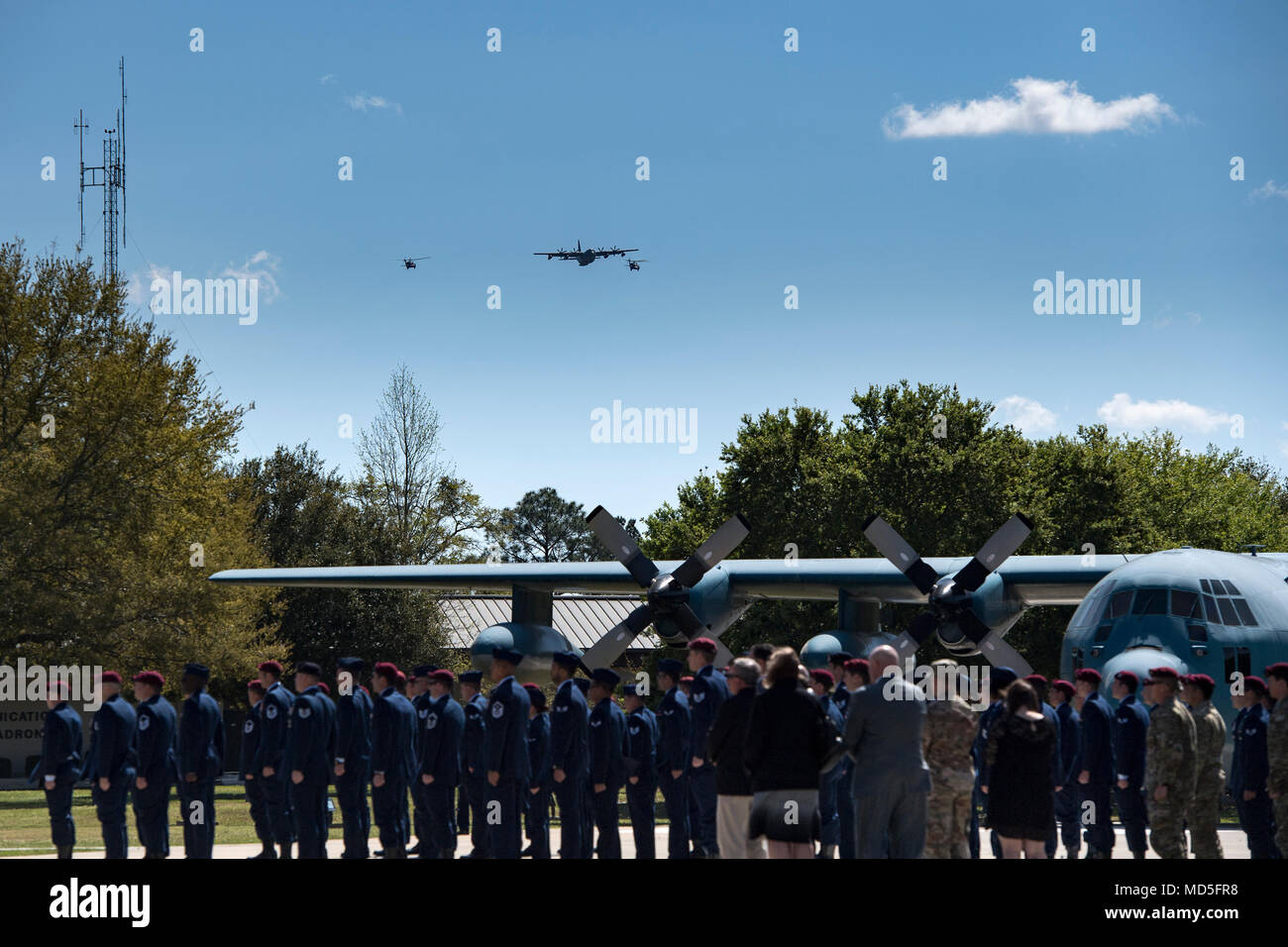 An HC-130J Combat King II and two HH-60G Pave Hawks fly over a ...