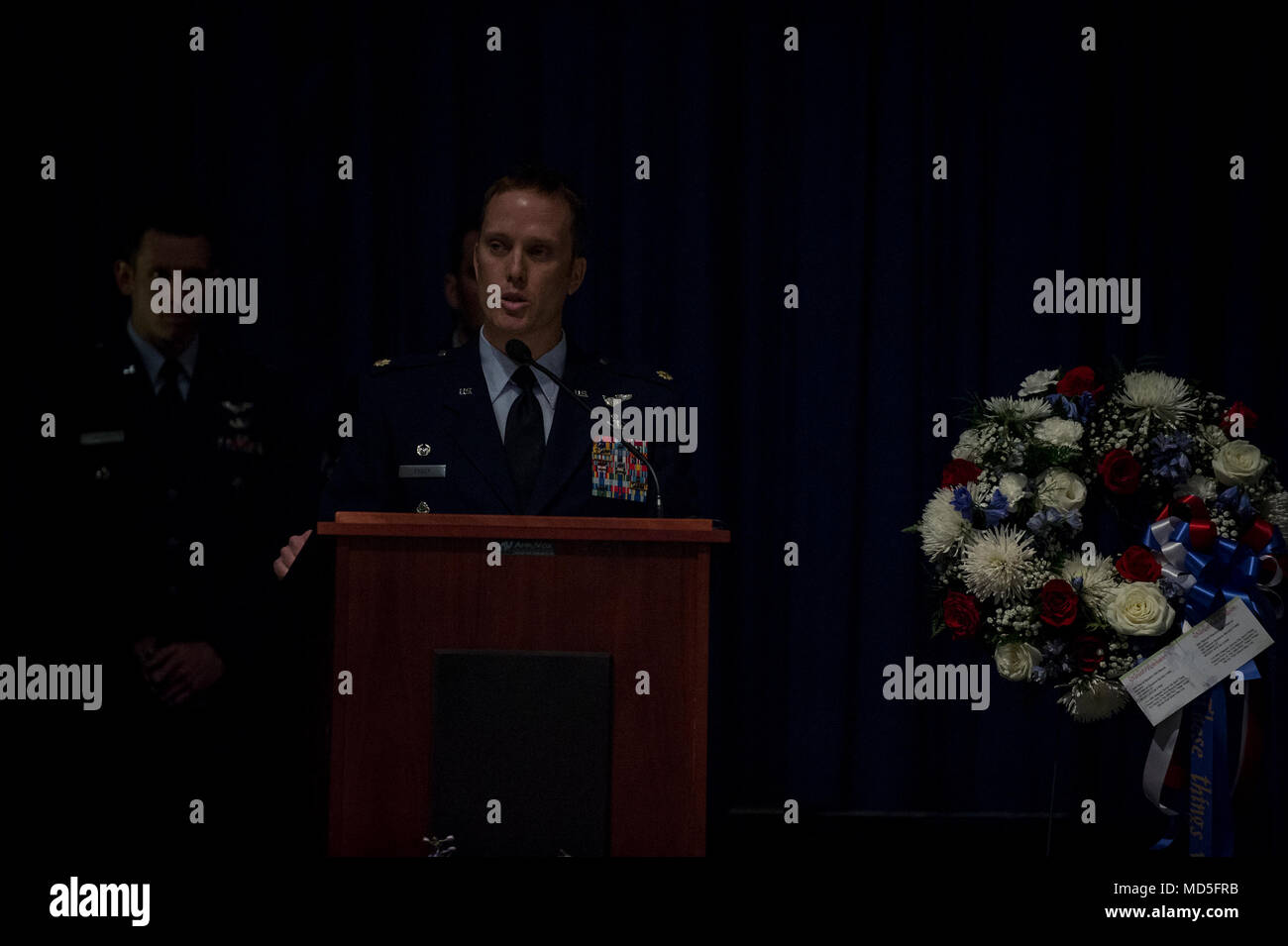 Maj. Jason Egger, 38th Rescue Squadron commander, speaks during a ...