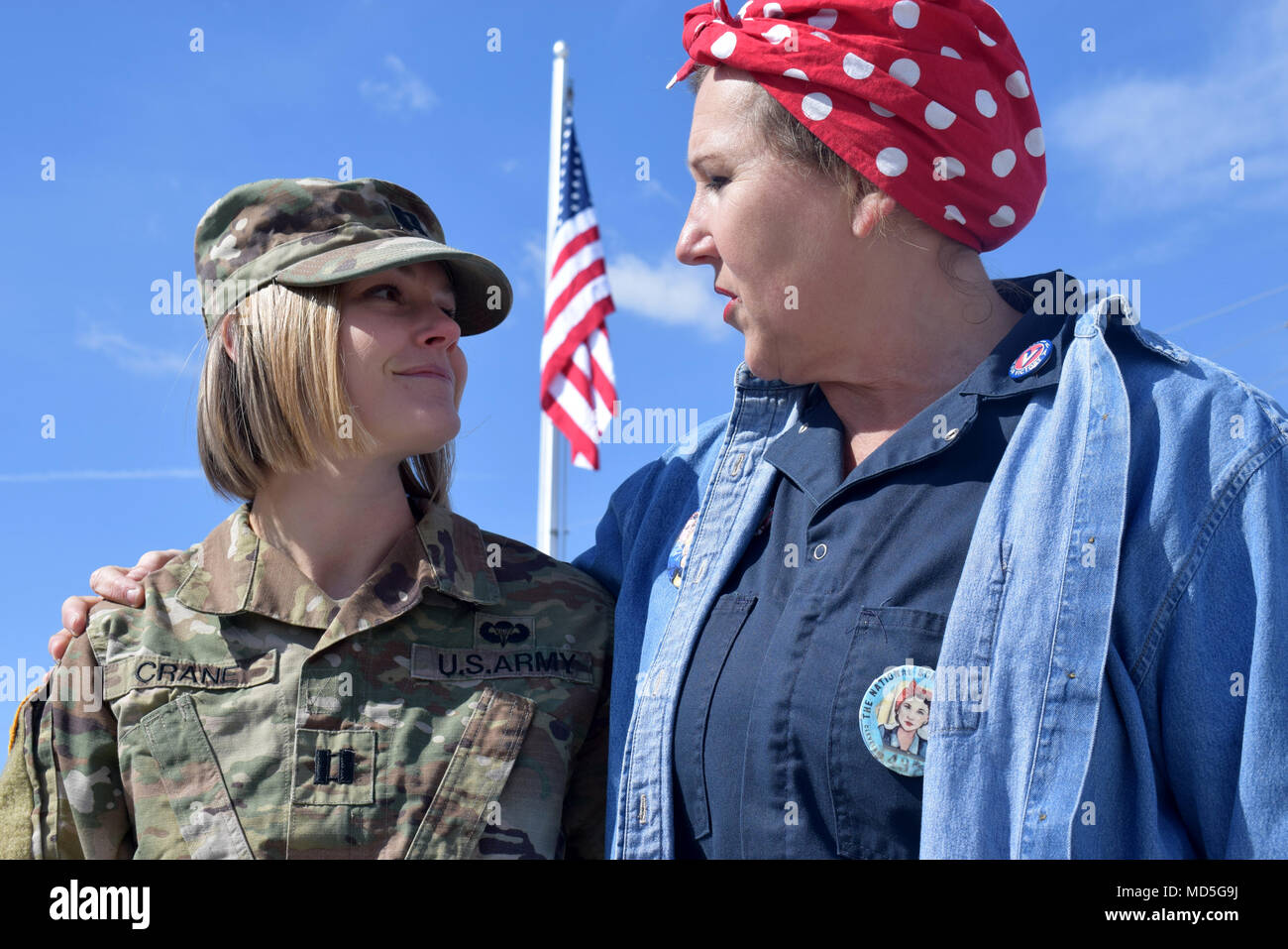 Angie Timan (right) speaks to Capt. Amy Crane (left), a Soldier ...